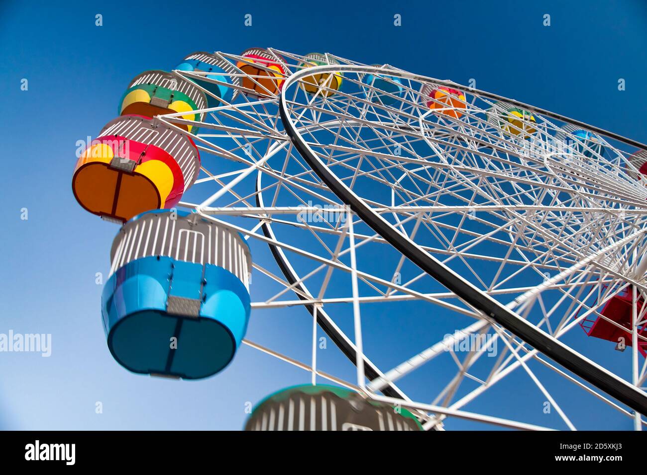 Amazing colors of Luna Park Ferris Wheel at sunset Stock Photo - Alamy