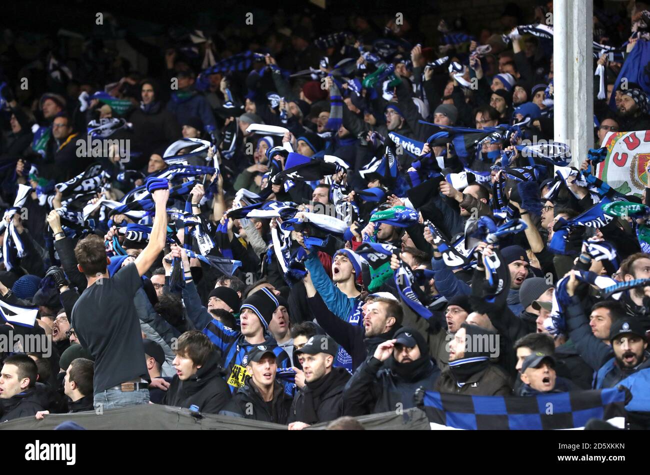 Atalanta fans in the stands rally behind their team Stock Photo - Alamy