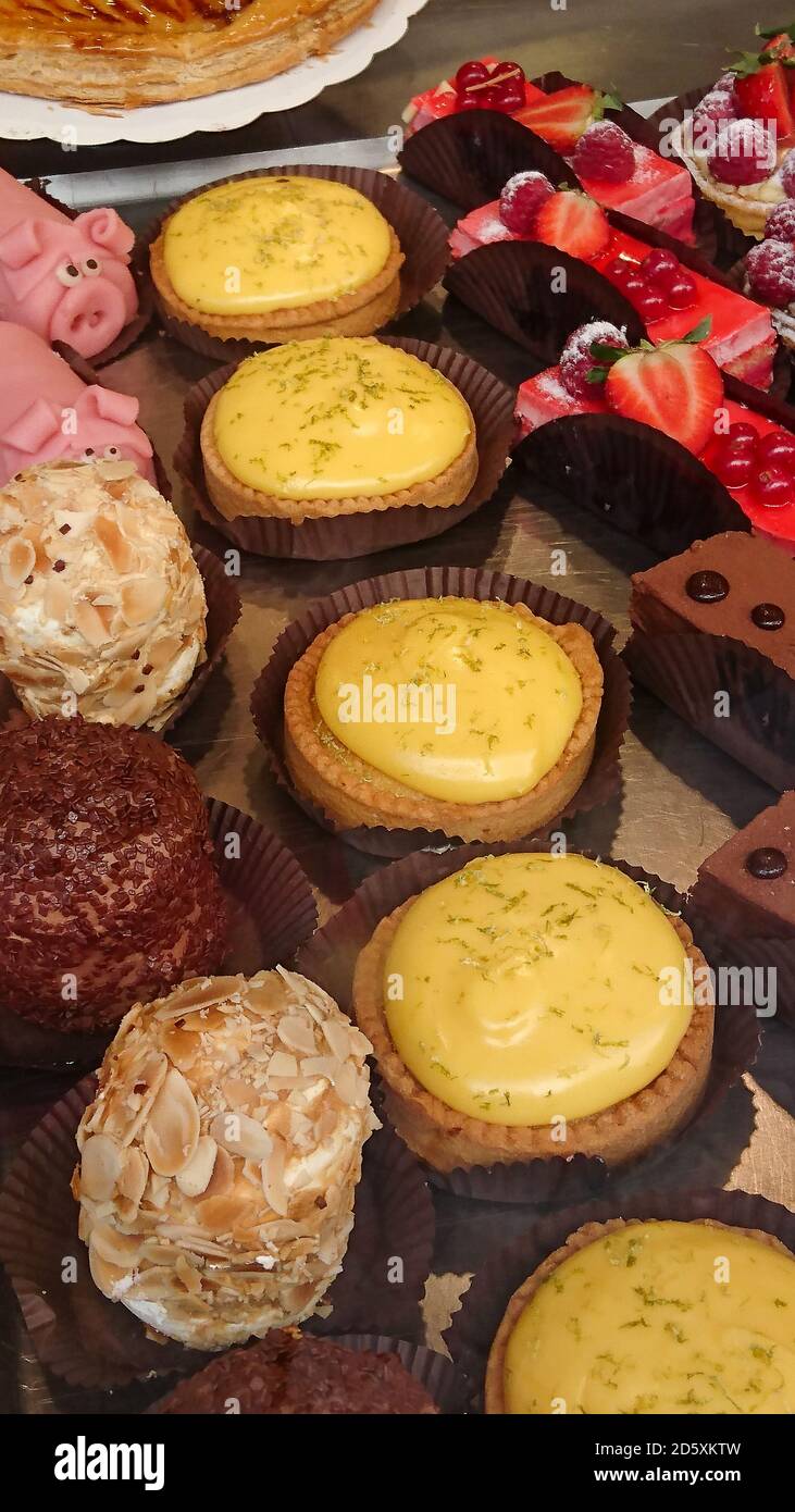 small pastries on a bakery display Stock Photo - Alamy