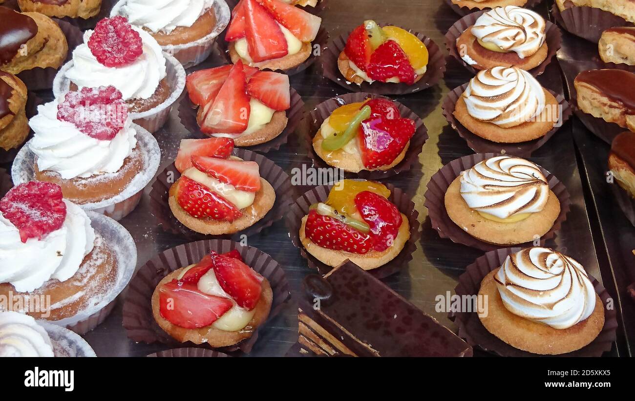 small pastries on a bakery display Stock Photo - Alamy