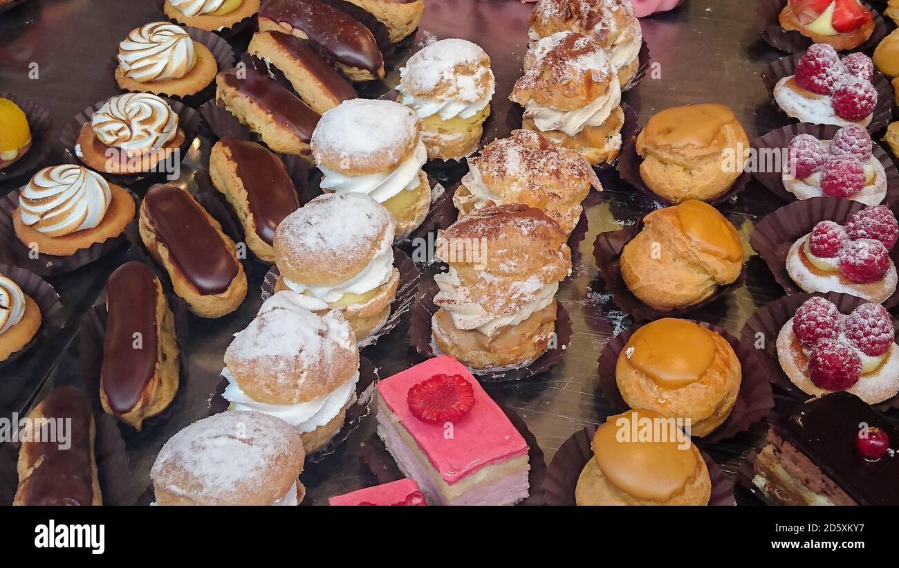 small pastries on a bakery display Stock Photo - Alamy