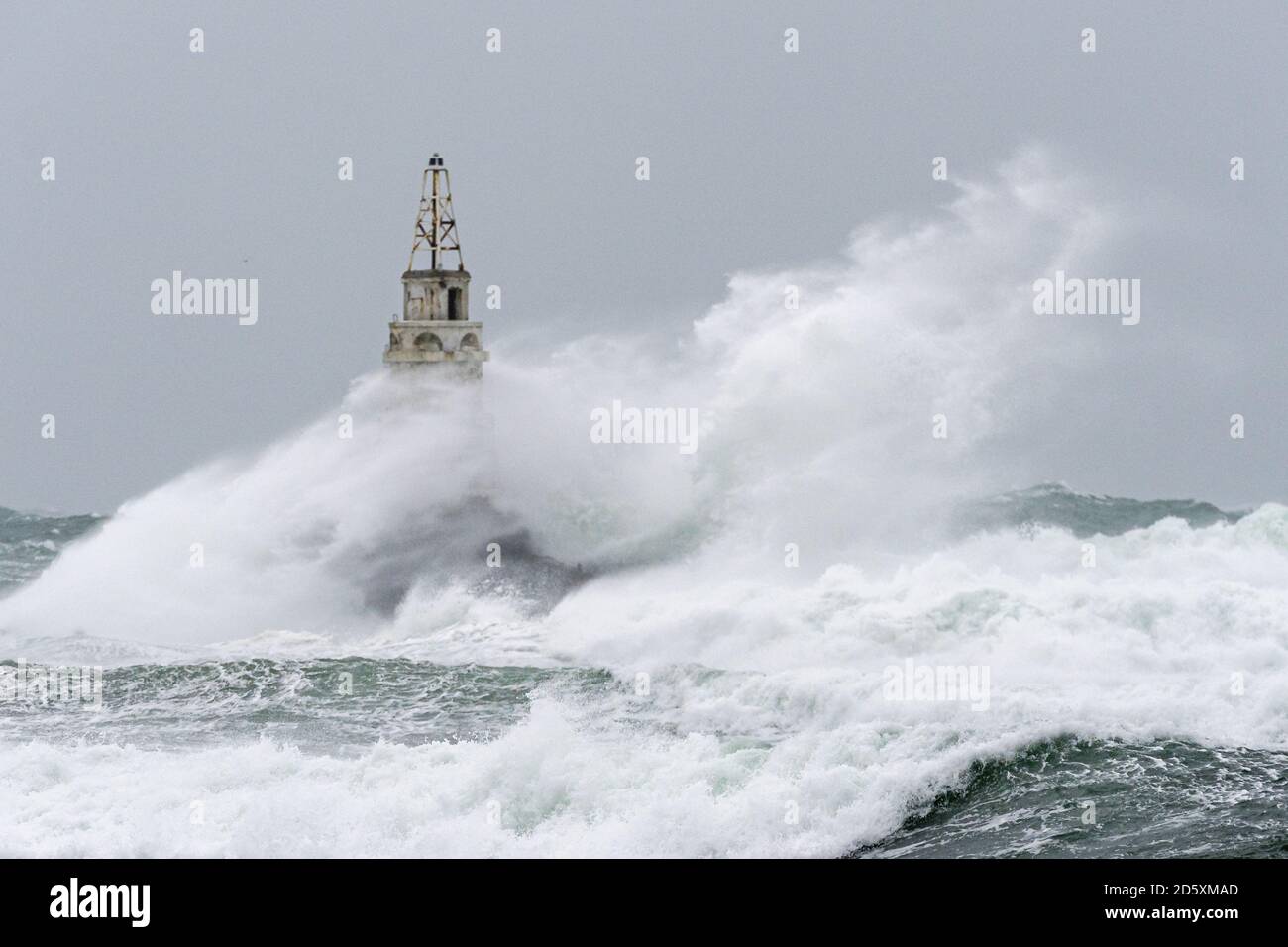 Lighthouse during severe sea storm Stock Photo - Alamy