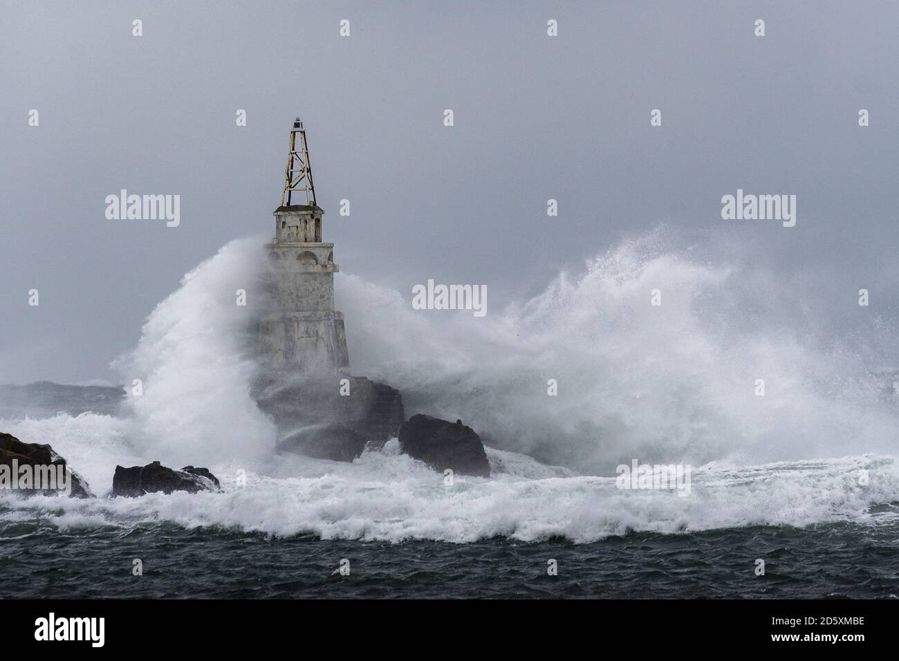 Lighthouse during severe sea storm Stock Photo - Alamy