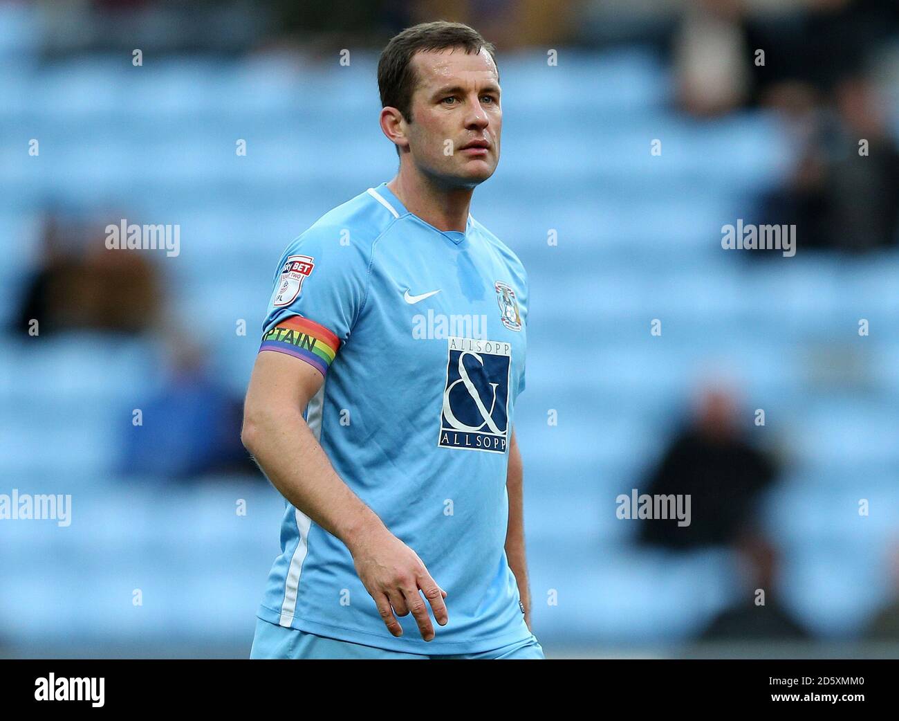 Coventry City's captain Michael Doyle wears a rainbow captains armband ...