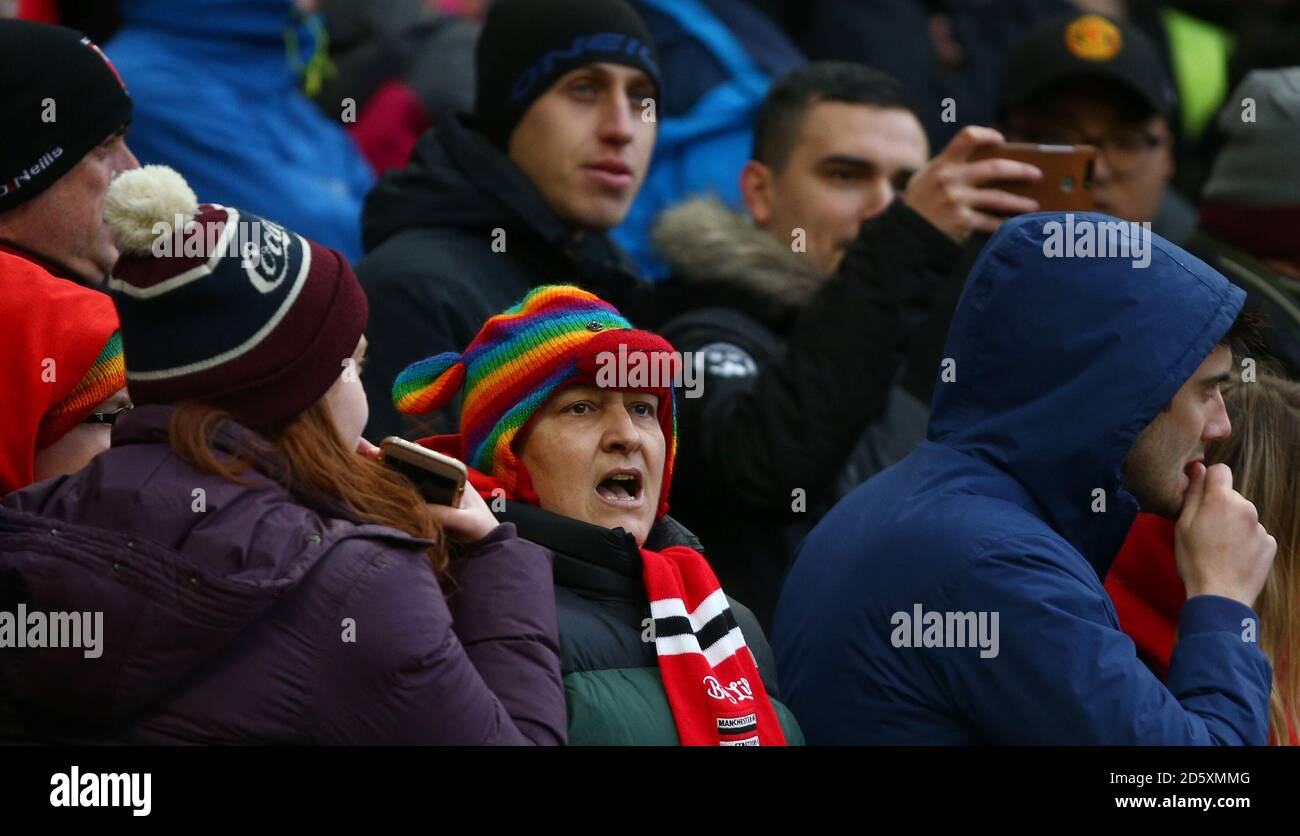 Manchester United fans in the stands Stock Photo - Alamy