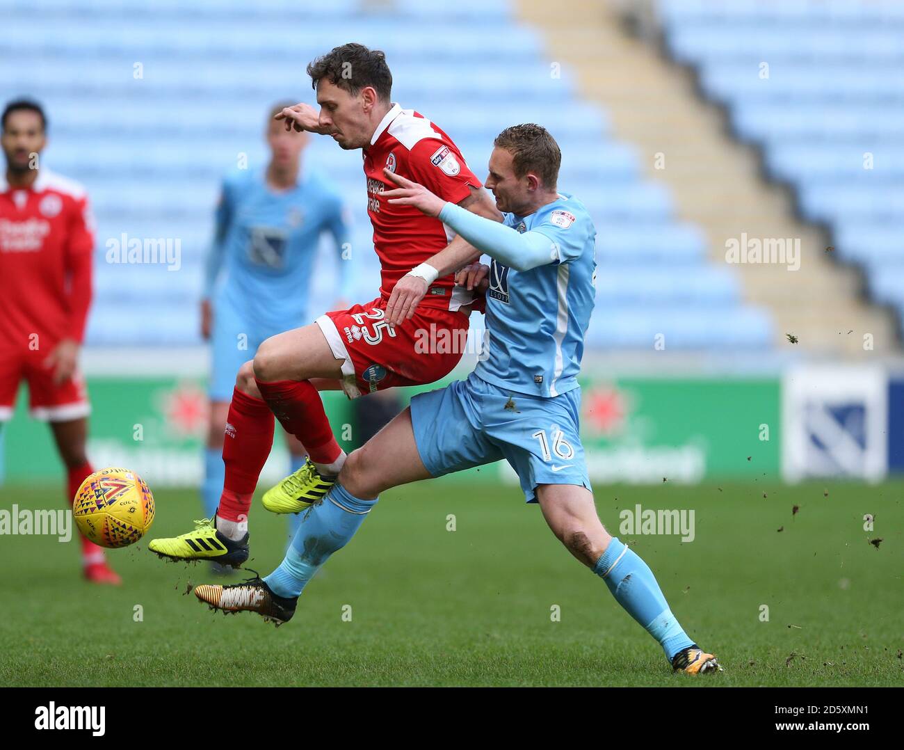 Coventry City's Stuart Beavon (right) and Crawley Town's Mark Randall ...