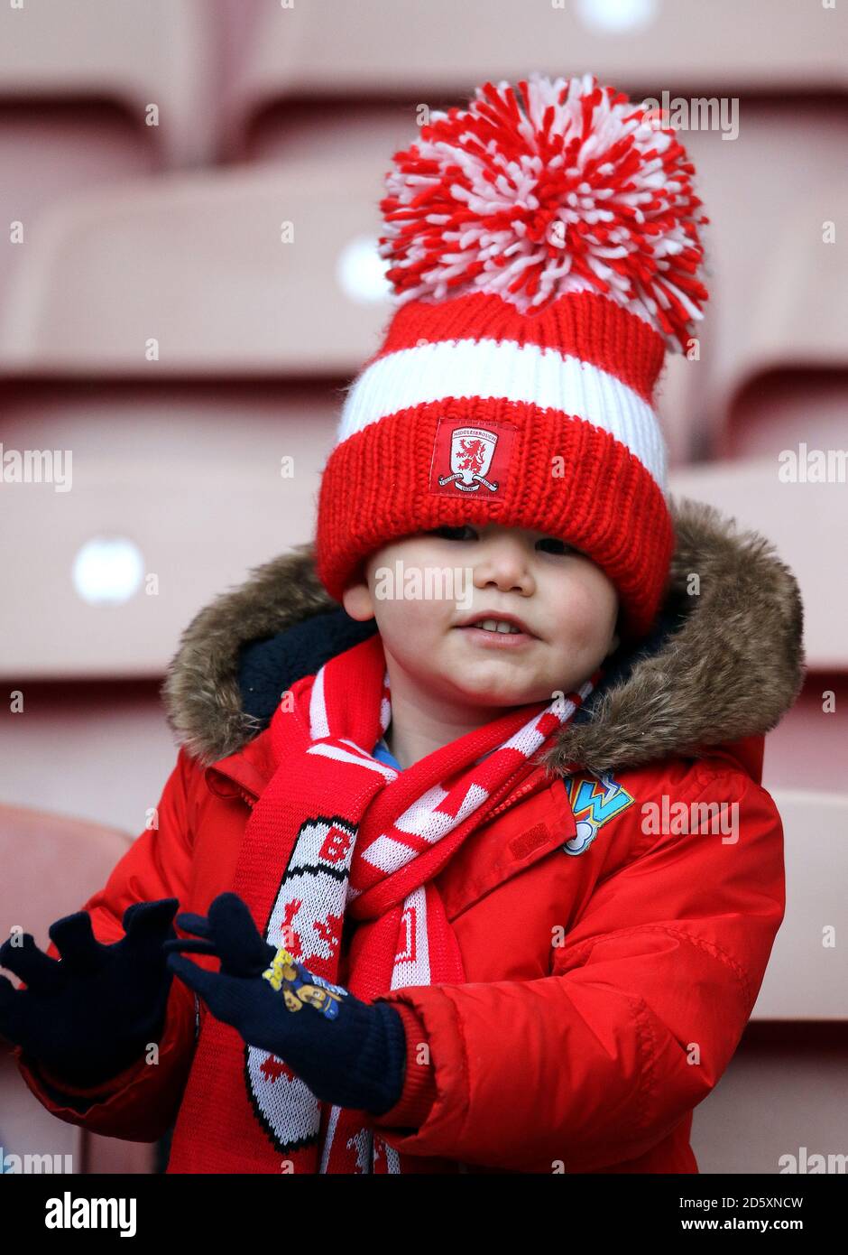 A young Middlesbrough fan with wooly hat in the stand Stock Photo - Alamy
