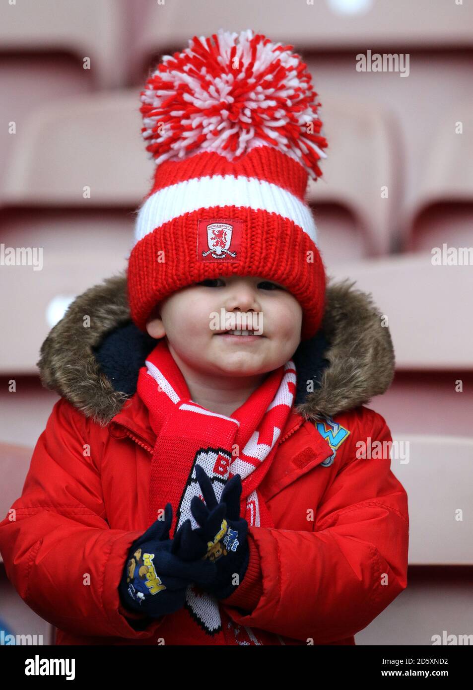 A young Middlesbrough fan with wooly hat in the stand Stock Photo - Alamy