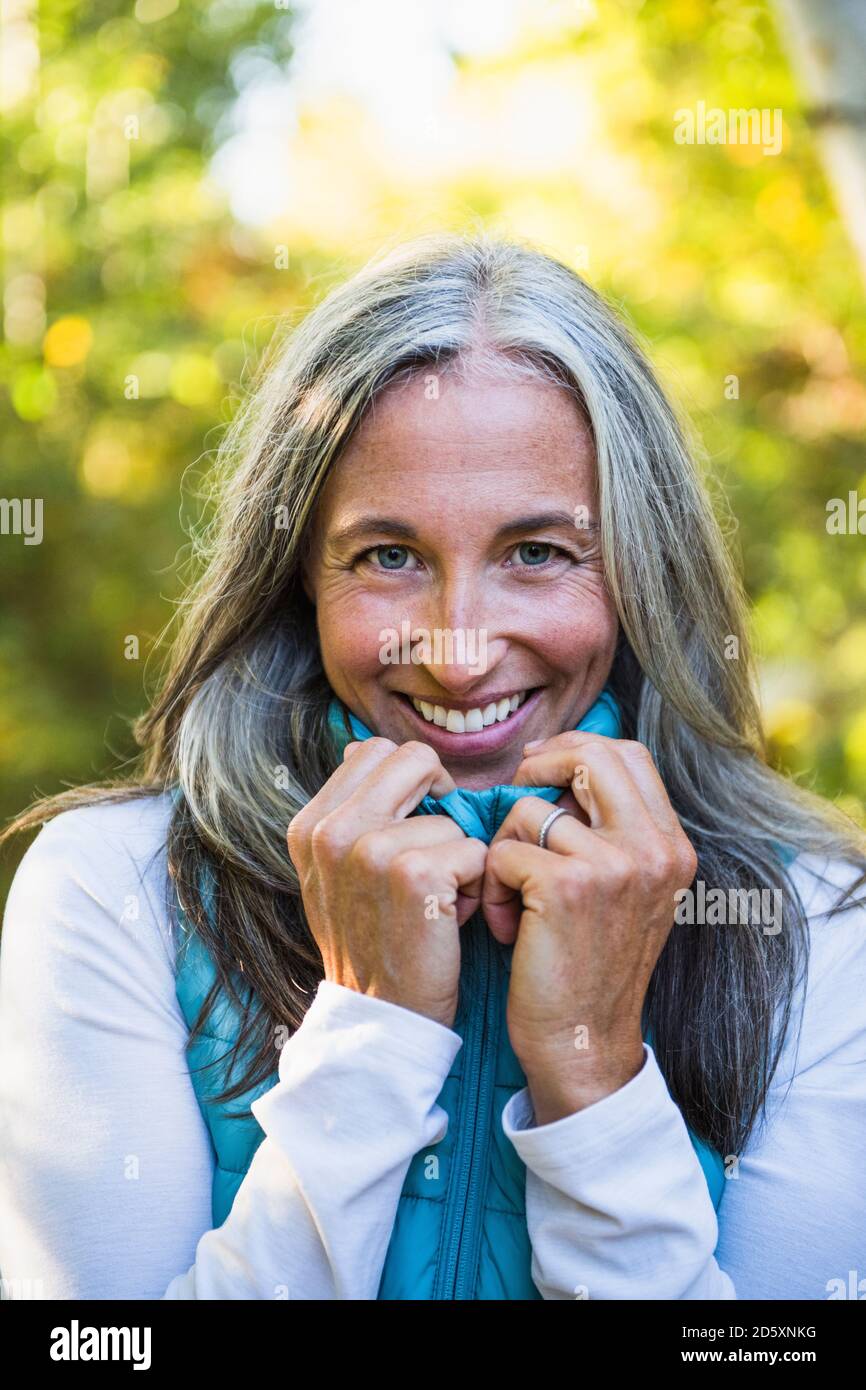 Gray Haired Woman enjoying a nature walk Stock Photo - Alamy
