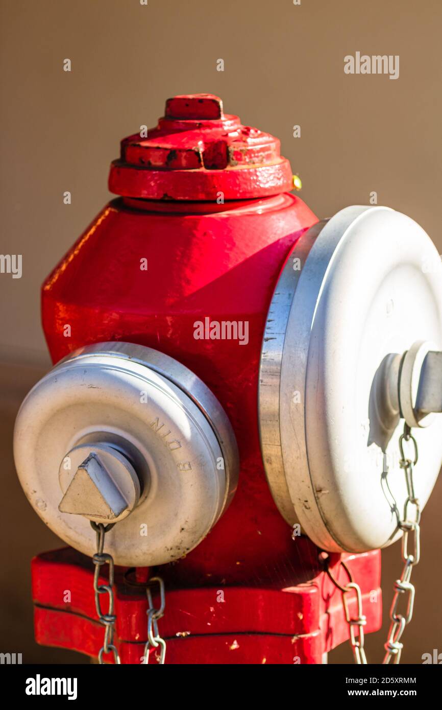Close up on detail of red street hydrant isolated Stock Photo - Alamy