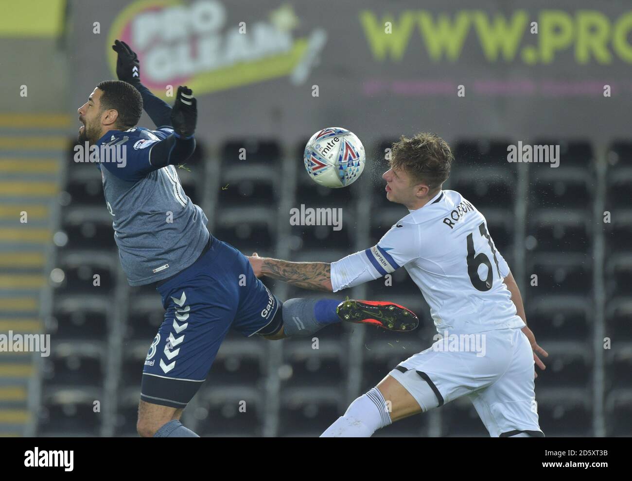Swansea U21's Joe Rodon and Charlton Athletic's Leon Best in action ...