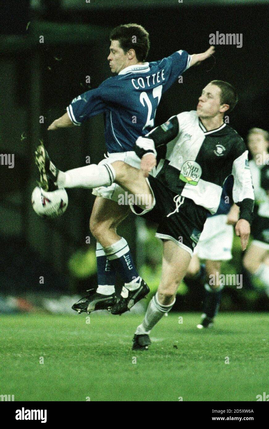 Leicester City's Tony Cottee battles for the ball with Hereford United ...