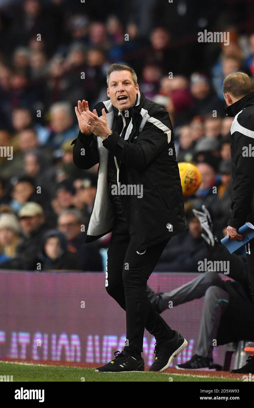 Millwall manager Neil Harris encourages his team Stock Photo - Alamy