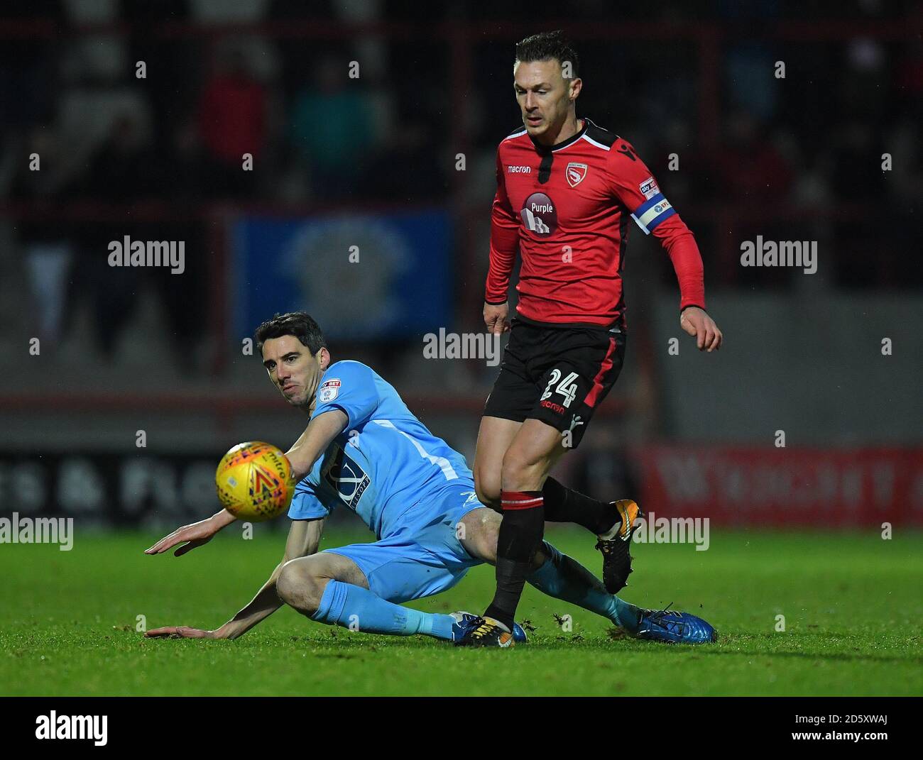 Coventry City's Peter Vincenti battles with Morecambe's Michael Rose ...