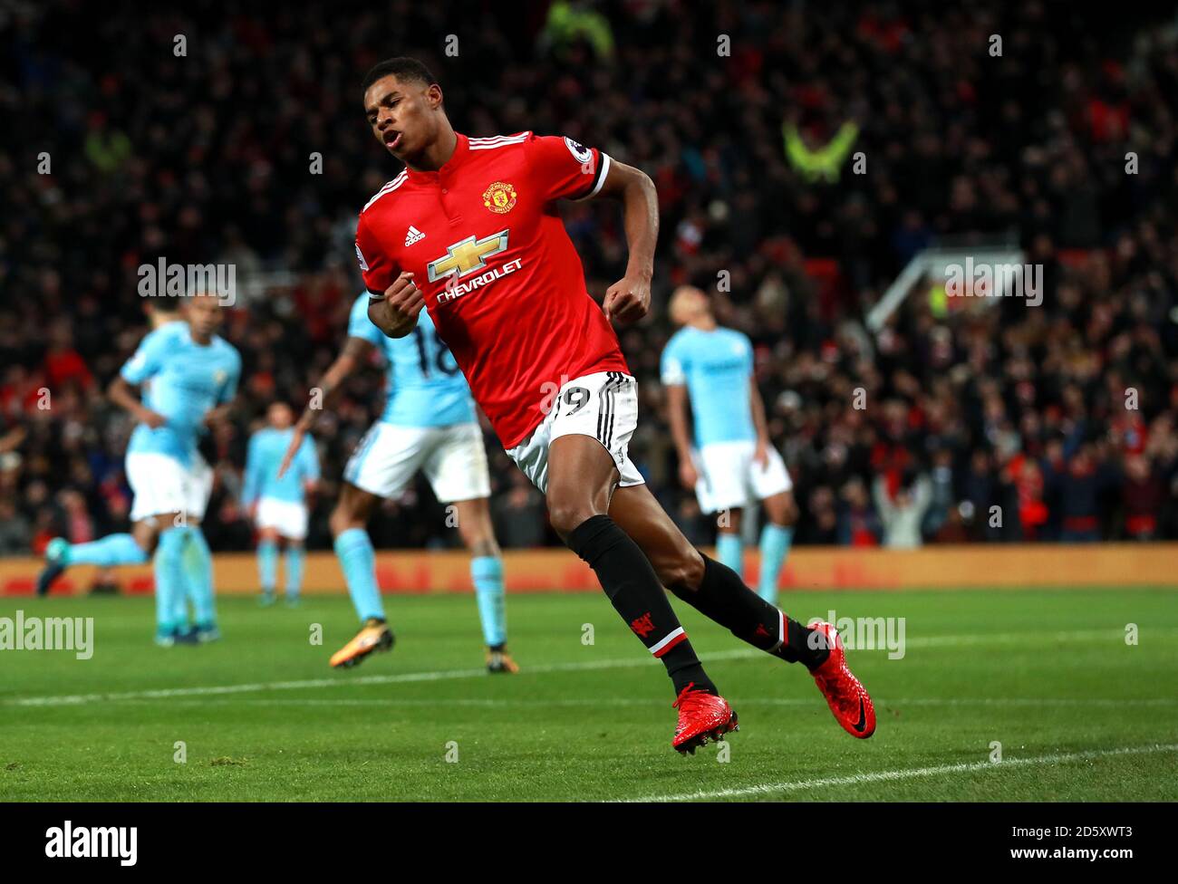 Manchester United's Marcus Rashford celebrates scoring his side's first ...