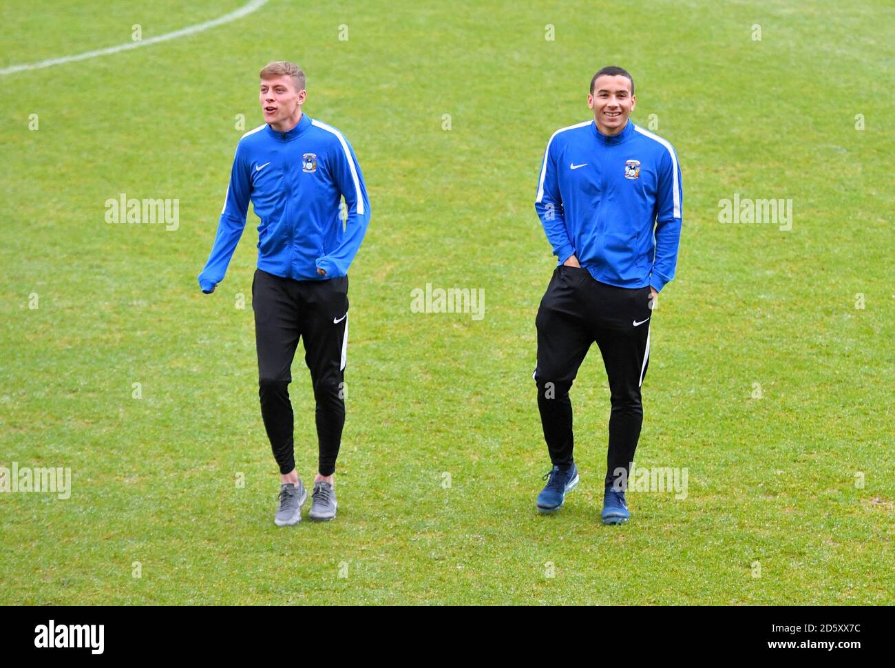 Coventry City's Tom Davies and Rod McDonald inspect the pitch ahead of ...