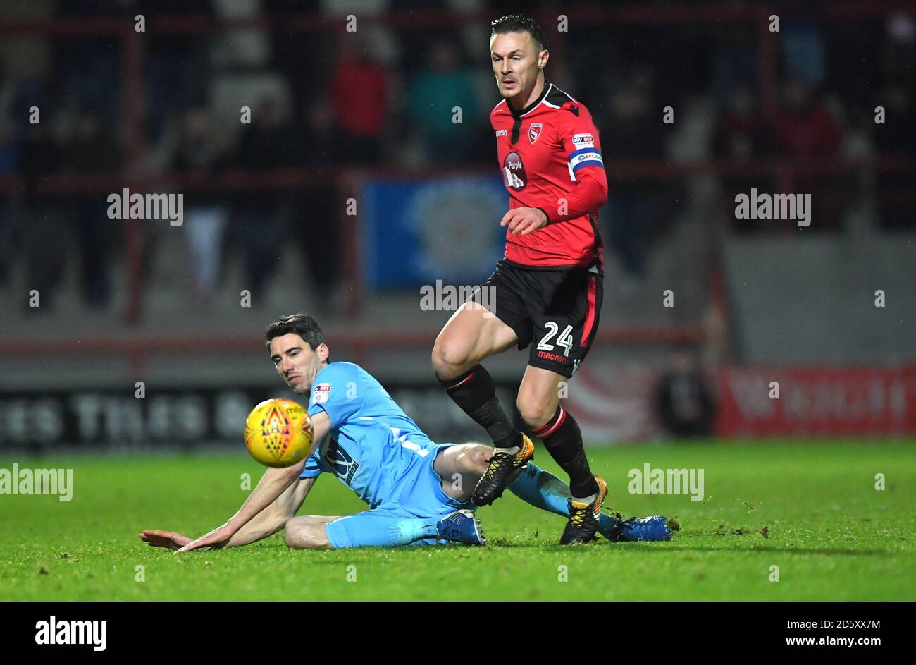 Coventry City's Peter Vincenti (left) and Morecambe's Michael Rose ...
