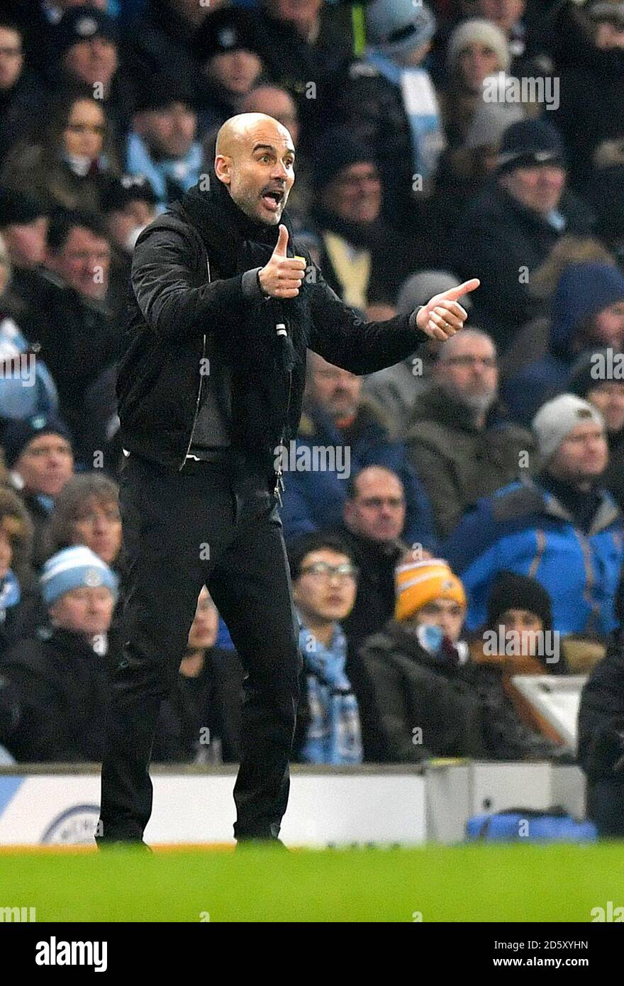 Manchester City manager Pep Guardiola gestures on the touchline Stock ...