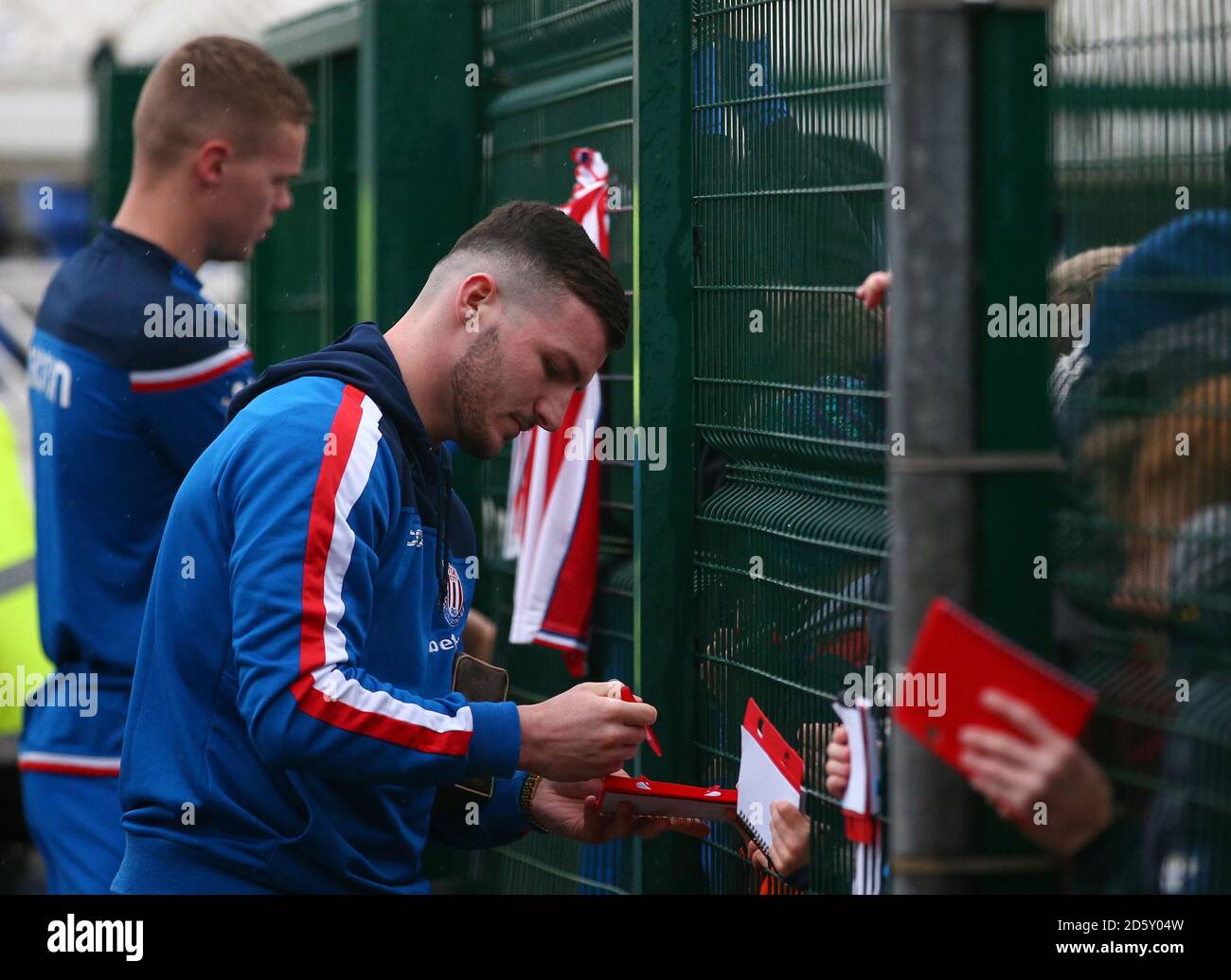 Stoke City's Tom Edwards signs autographs Stock Photo - Alamy