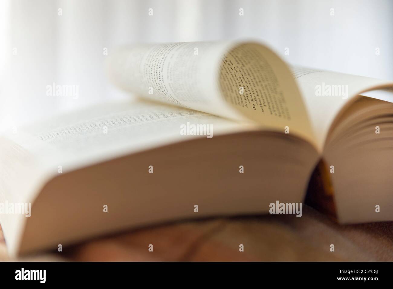 Rolled book hi-res stock photography and images - Alamy