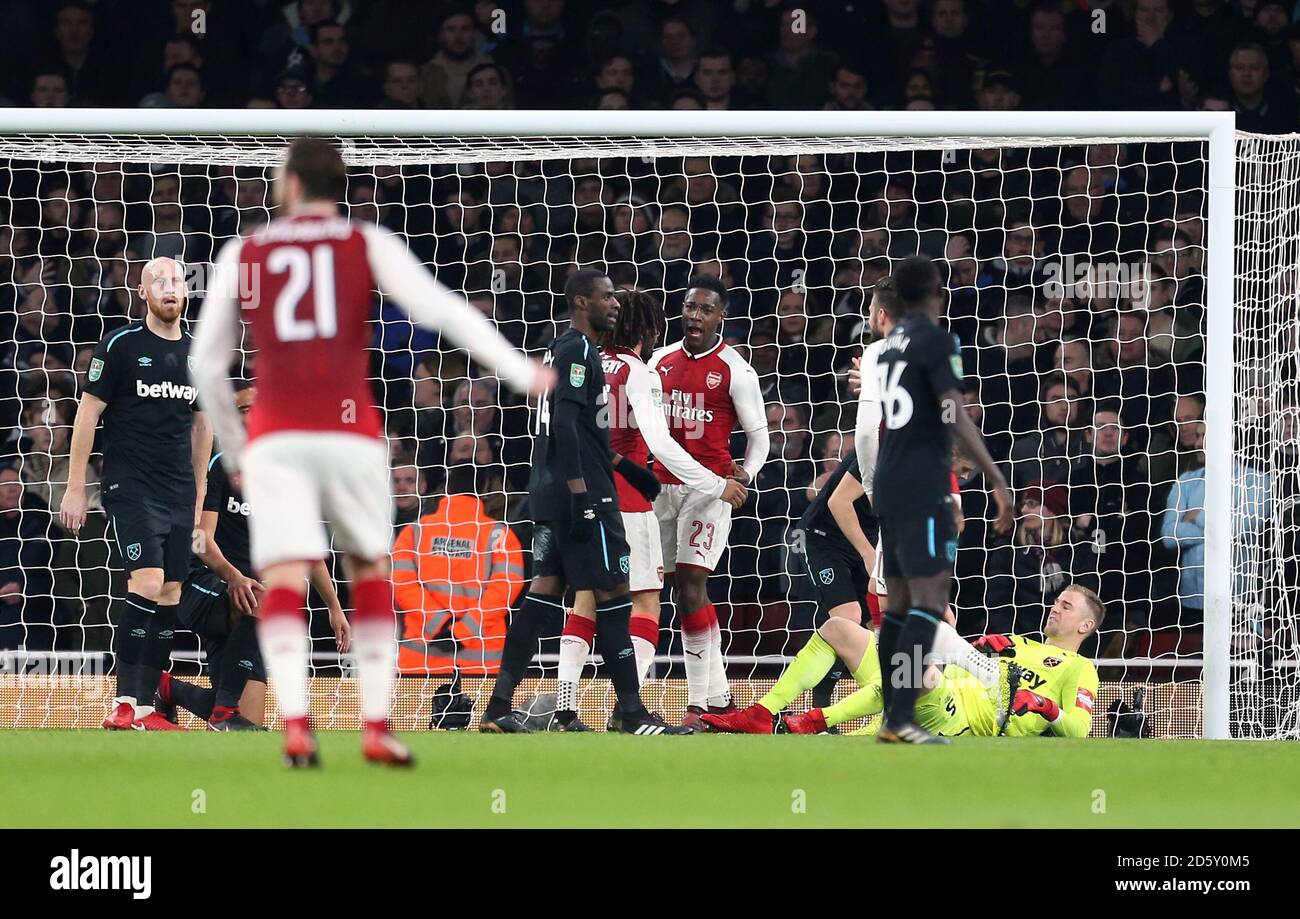 Arsenal's Danny Welbeck (no.23) celebrates scoring his side's first ...