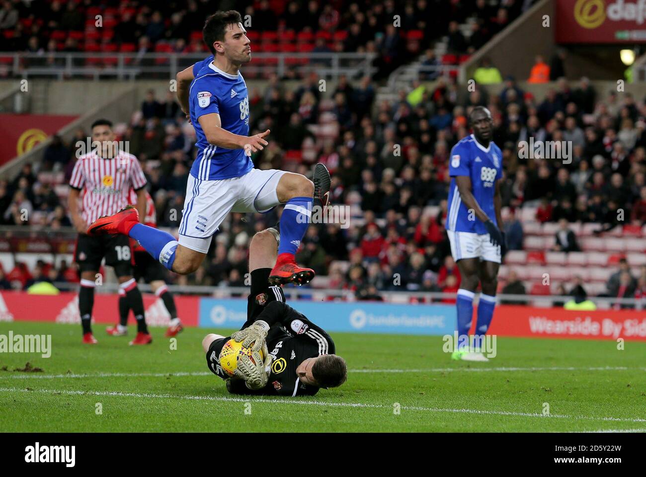 Birmingham City's Maxime Colin and Sunderland goalkeeper Robbin Ruiter ...