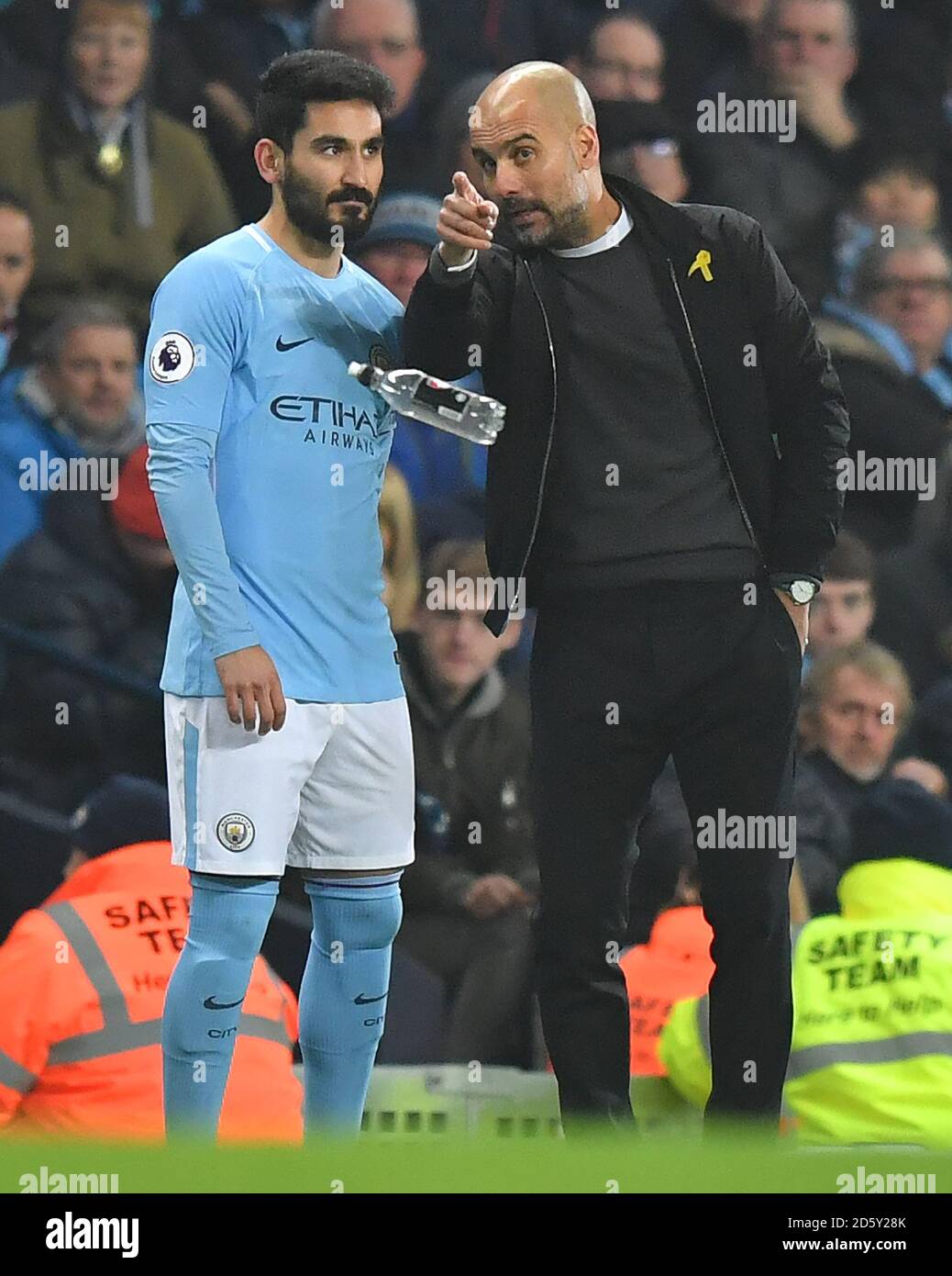 Manchaster City's Manager Josep Guardiola talks to Ilkay Gundogan Stock ...