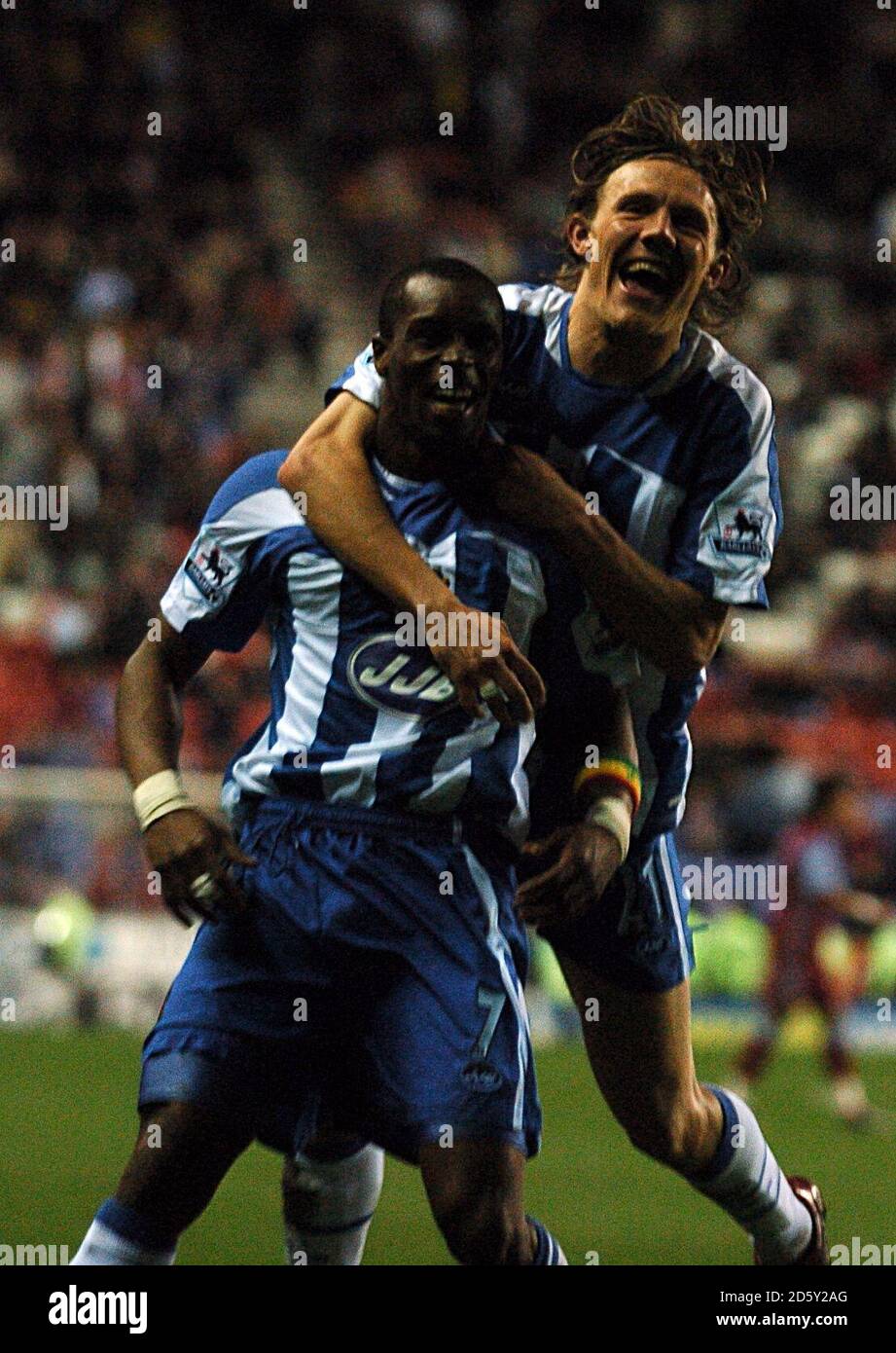 Wigan Athletic's Henri Camara celebrates his goal with Jimmy Bullard ...