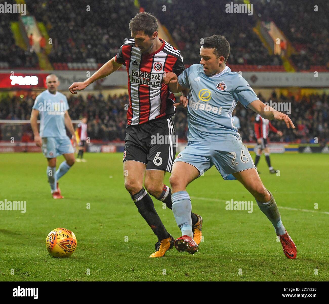 Sheffield United's Chris Basham battles with Sunderland's George ...