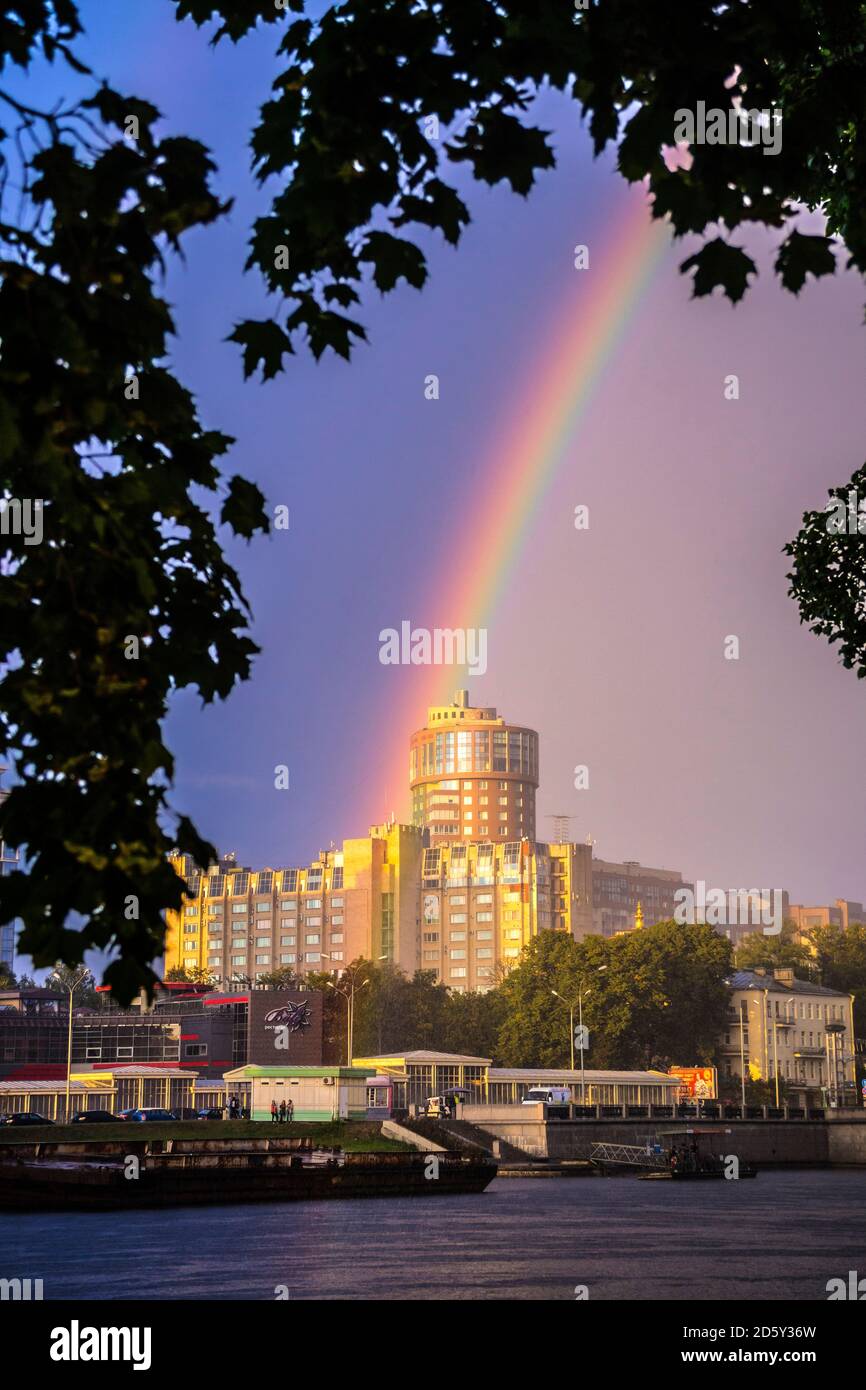 Rainbow over building at neva shipping pier hi-res stock photography ...