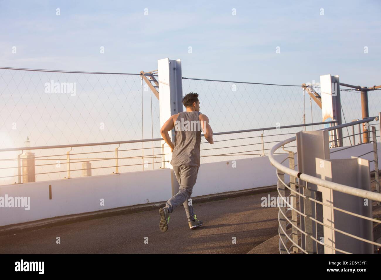 Man jogging on a ramp Stock Photo - Alamy