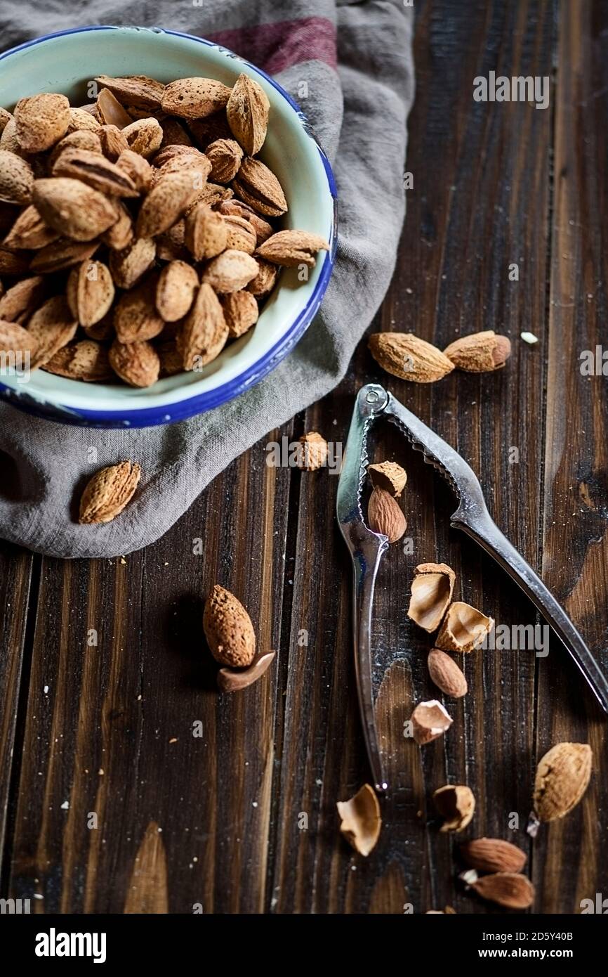 Roasted and salted almonds in shells, studio Stock Photo - Alamy