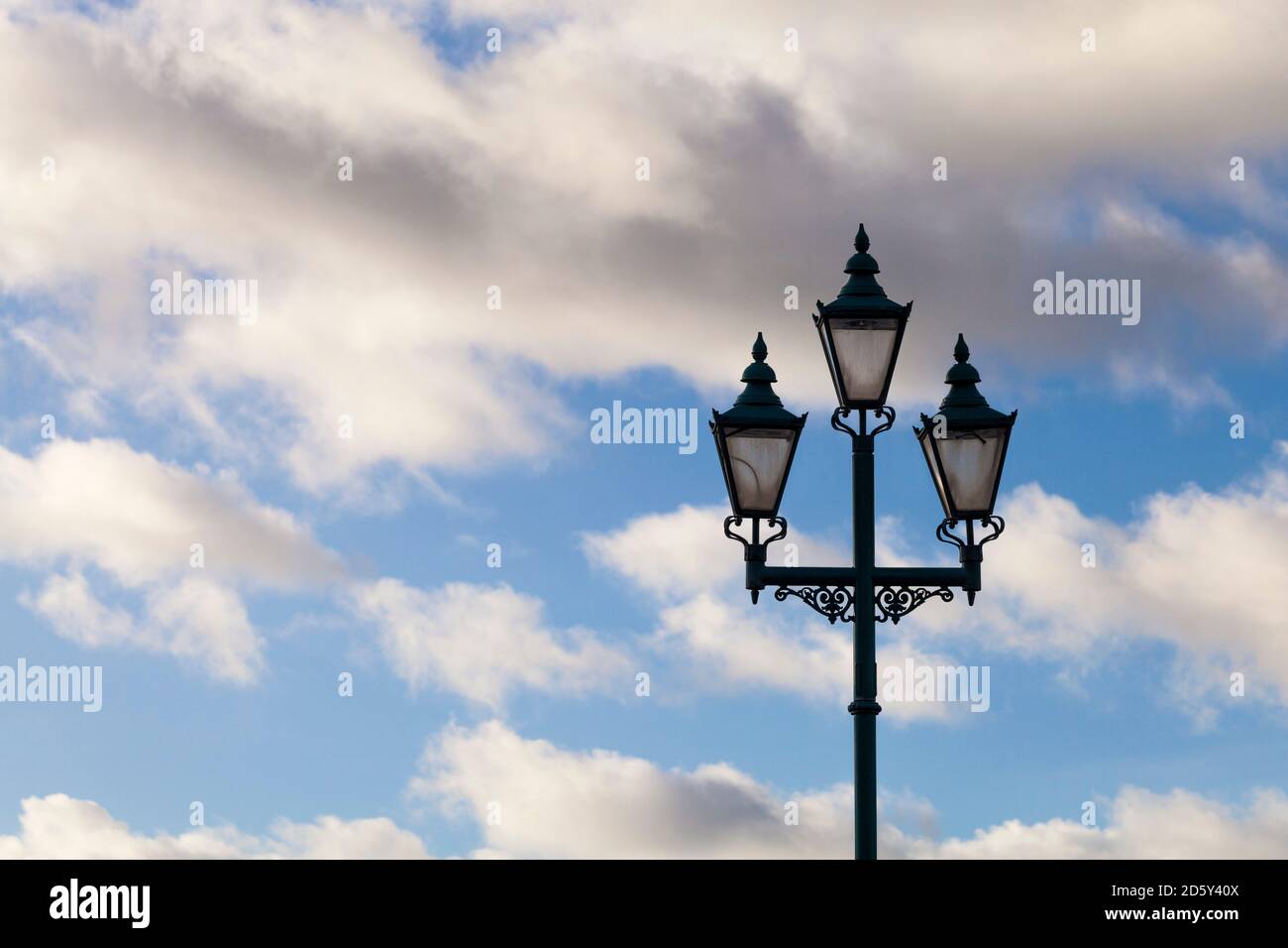 New Zealand, South Island, Hokitika, clouds and street lamp Stock Photo ...