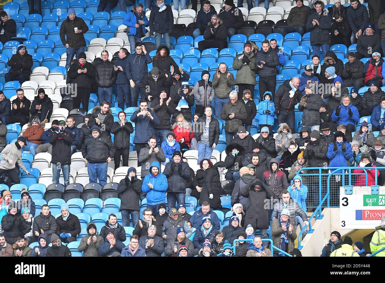 Coventry City fans in the stands Stock Photo - Alamy