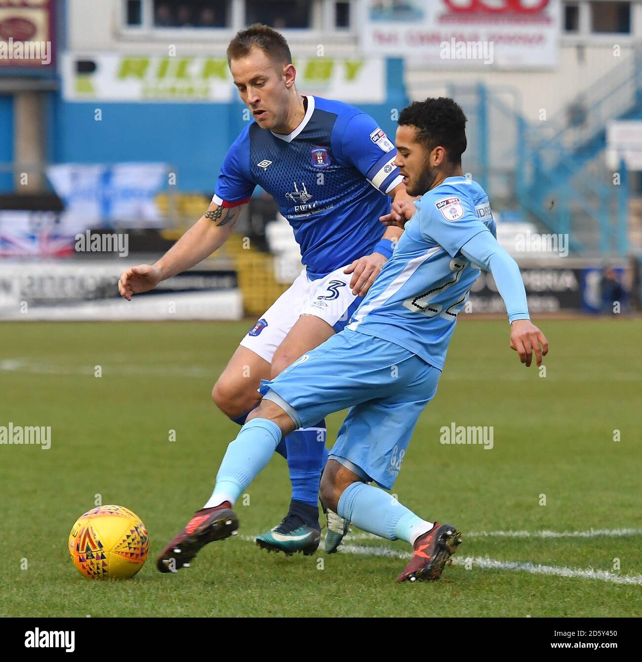 Coventry City's Devon Kelly-Evans battles with Carlisle United's Danny ...