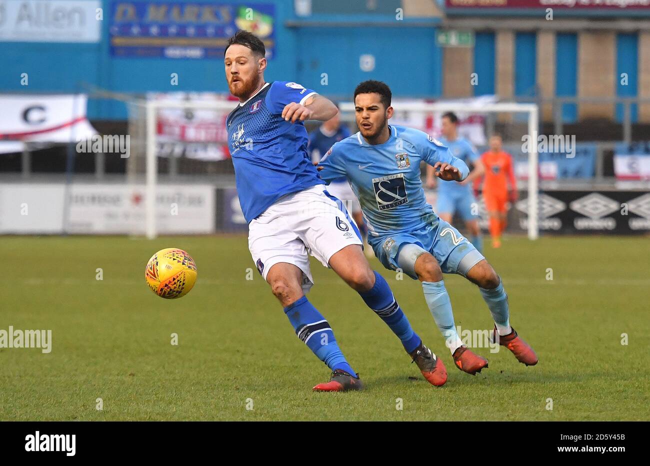 Coventry City's Devon Kelly-Evans battles with Carlisle United's Tom ...