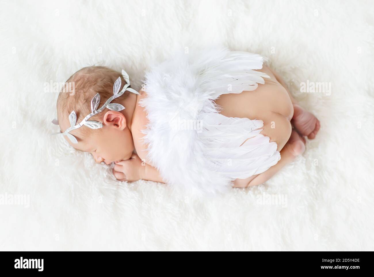 Newborn angel photo session in a suit. Selective focus. people Stock ...