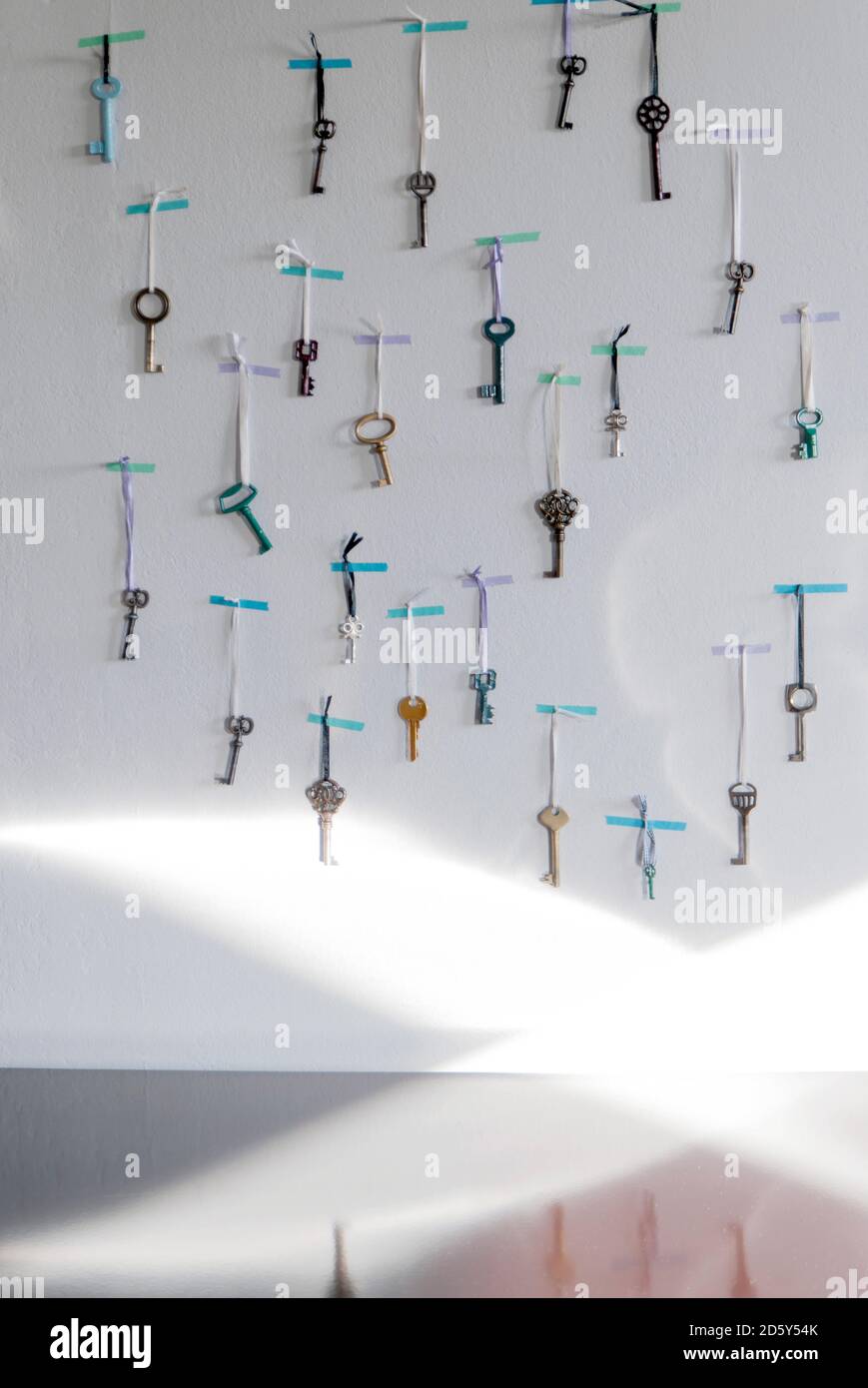 Old keys used as Advent calendar Stock Photo - Alamy