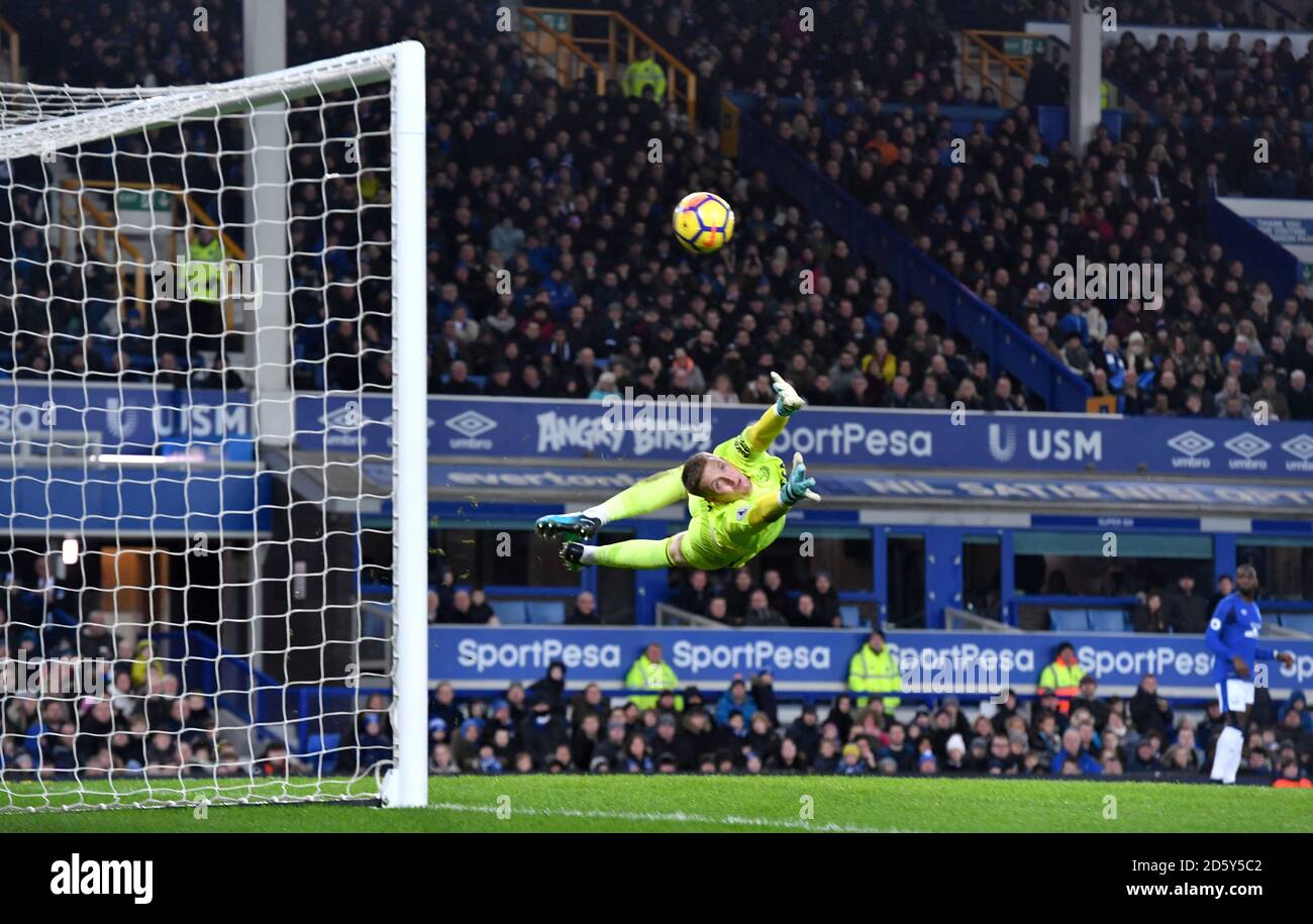 Everton goalkeeper Jordan Pickford makes a save Stock Photo - Alamy