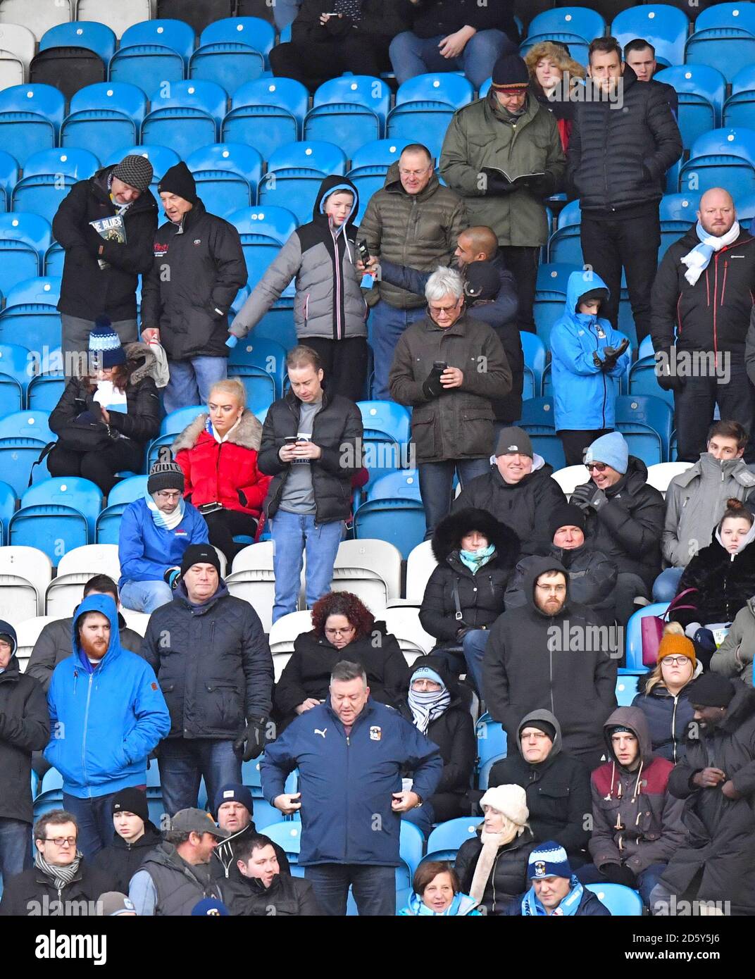 Coventry City fans in the stands Stock Photo - Alamy