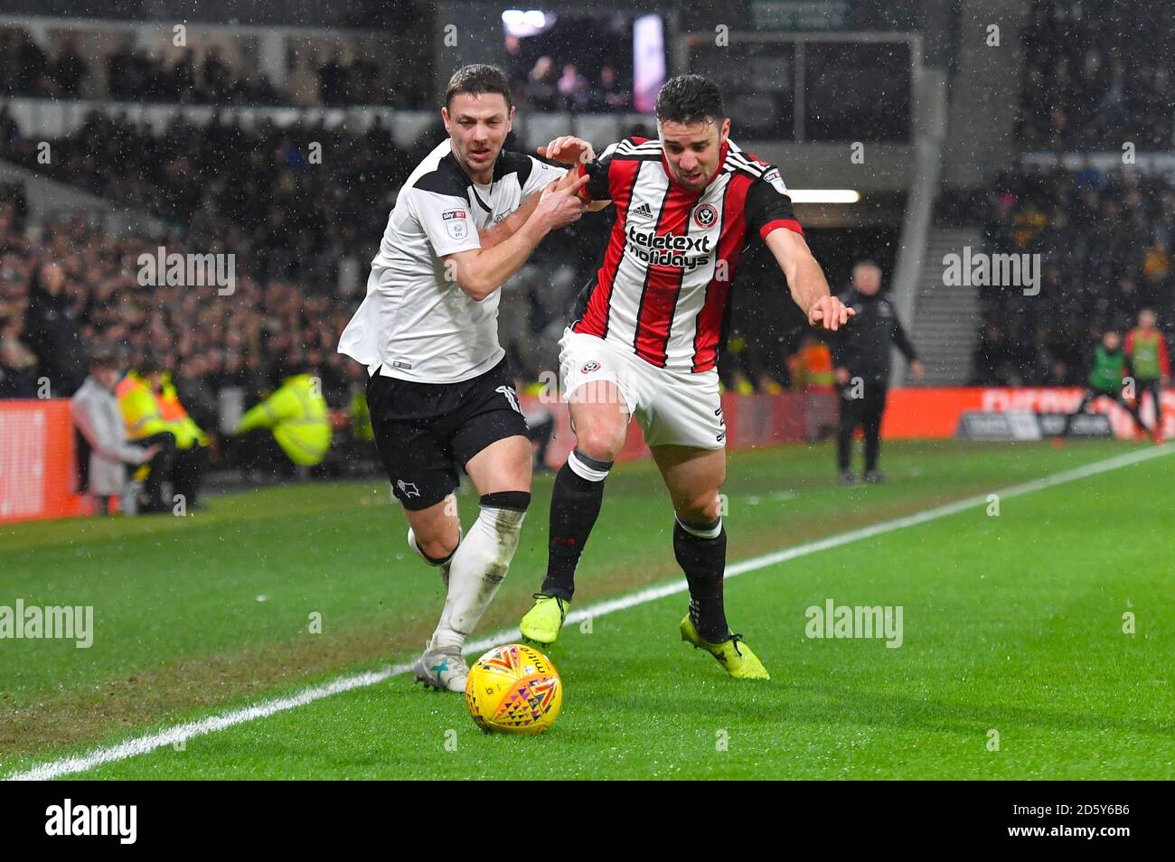 Derby County's Chris Baird (left) and Sheffield United's Enda Stevens ...