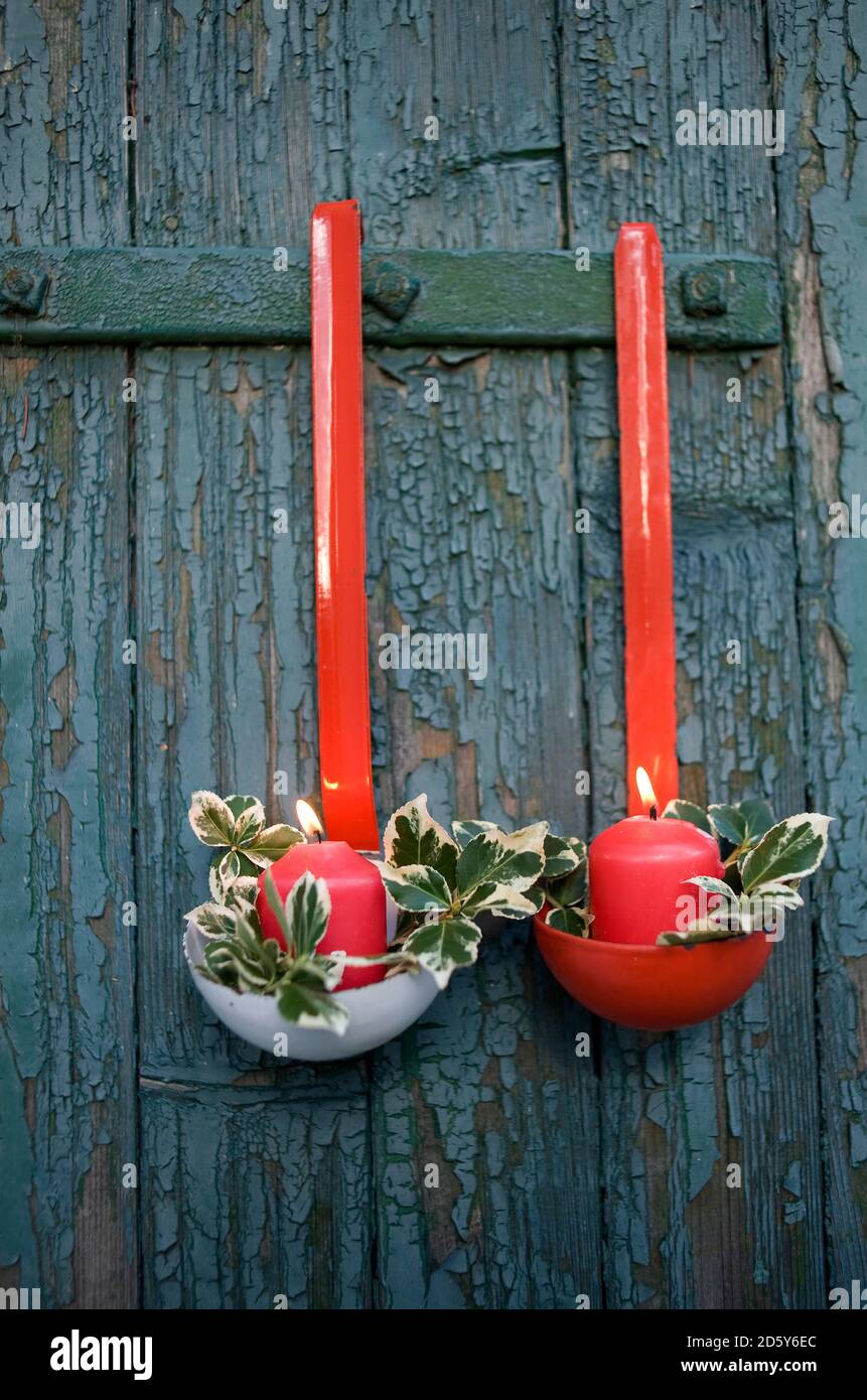 Christmas decoration with candle outdoors hi-res stock photography and ...