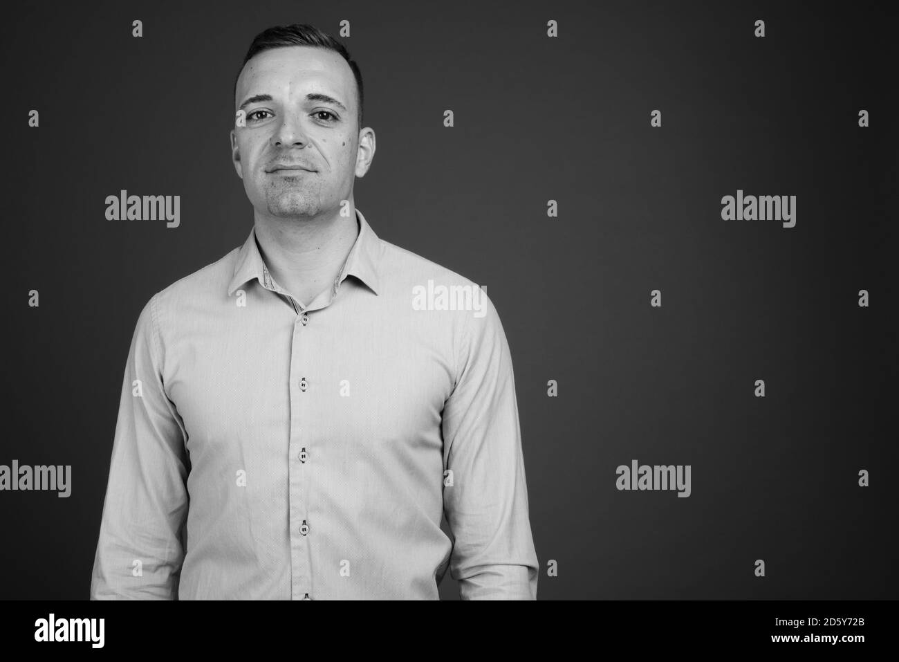 Business man gray background Black and White Stock Photos & Images - Alamy