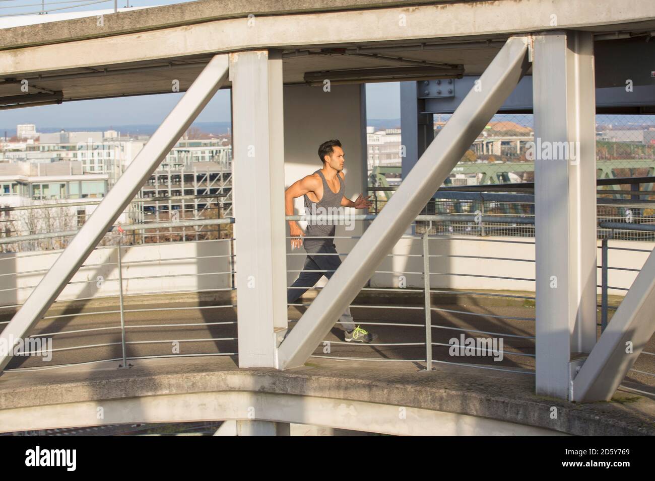 Man jogging on a ramp Stock Photo - Alamy