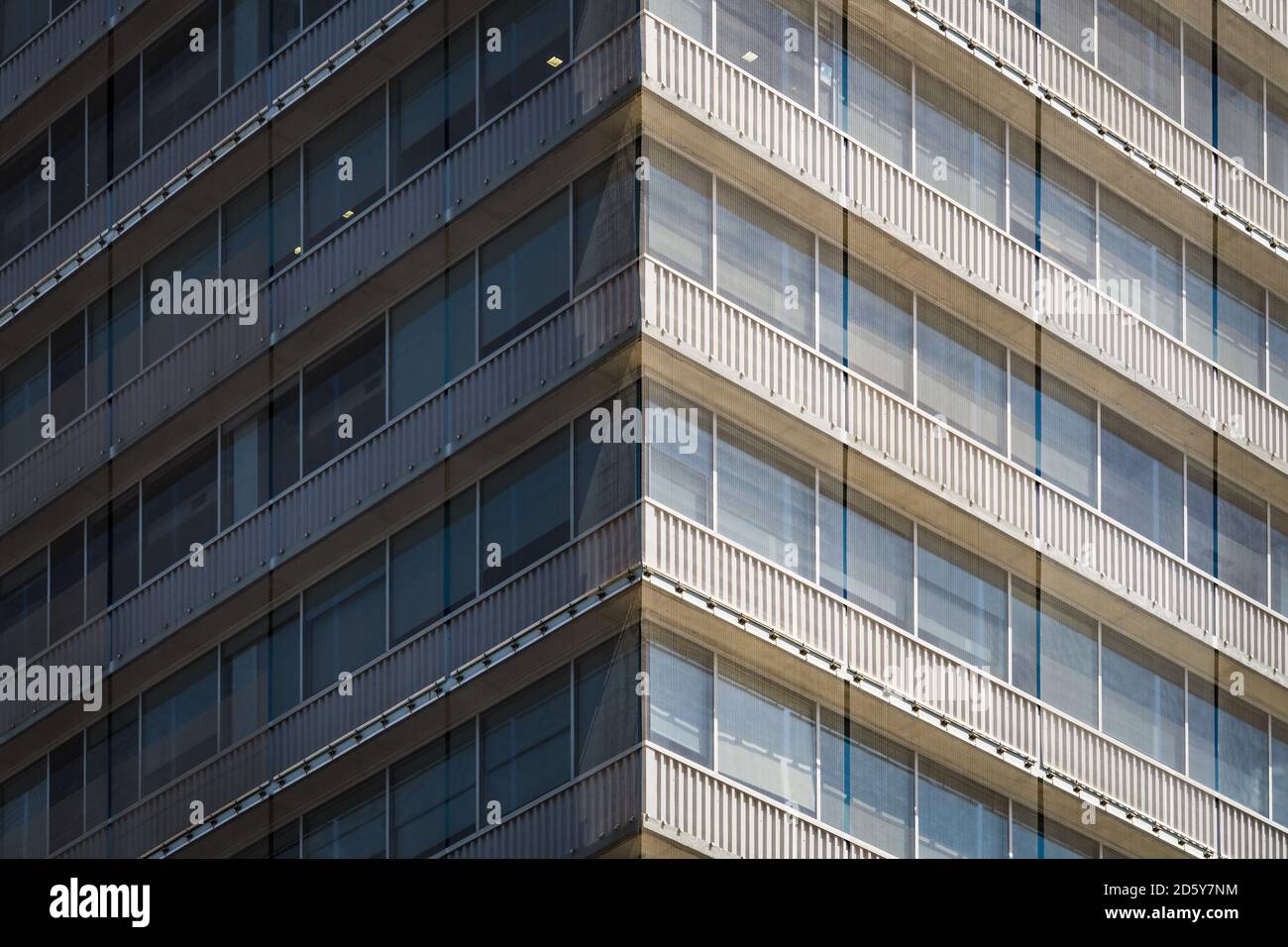 Symmetrical view of the corner of a residential building covered with a ...