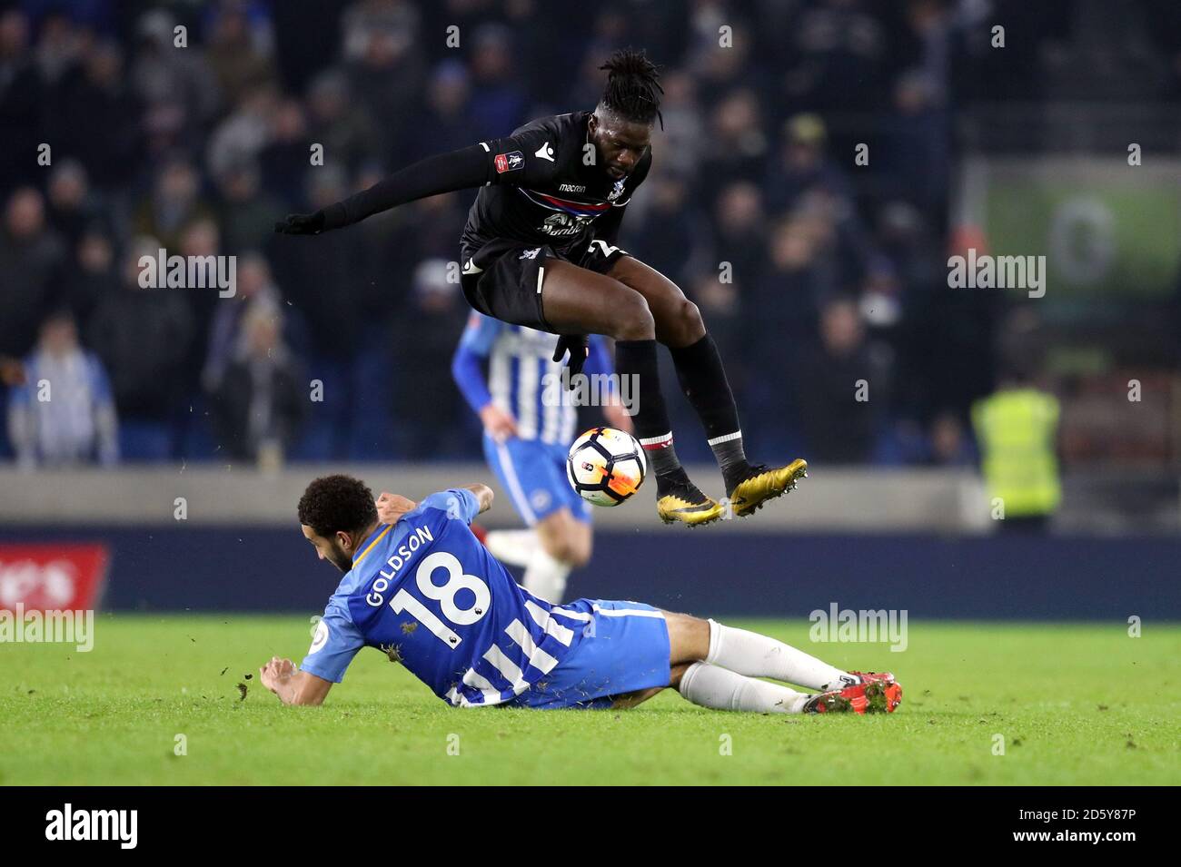 Crystal Palace's Bakary Sako jumps the tackle from Brighton & Hove ...