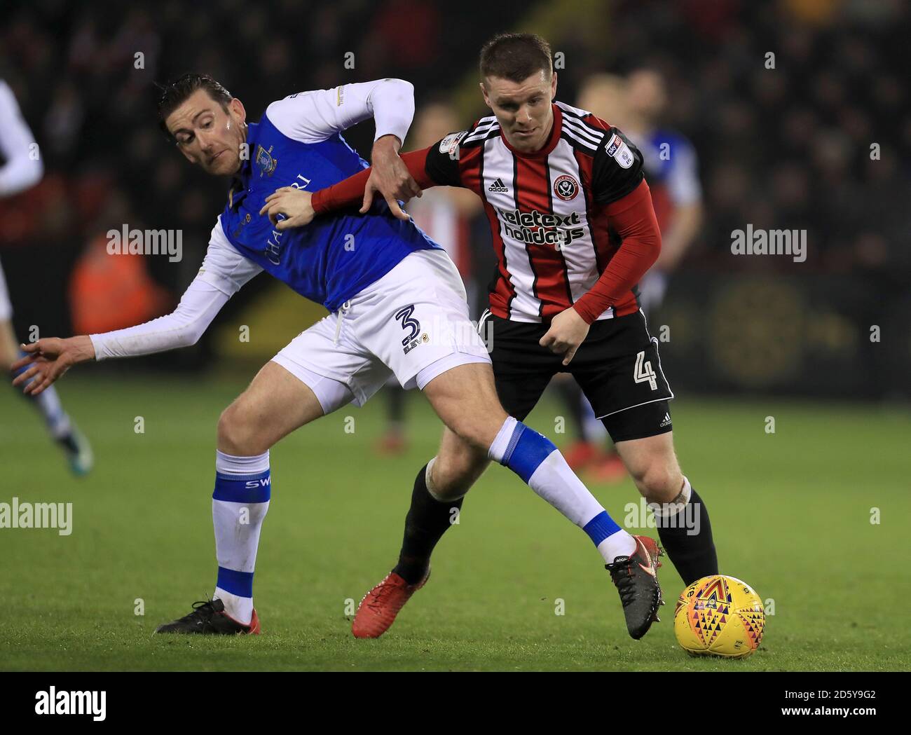 Sheffield Wednesday's David Jones (left) and Sheffield United's John ...