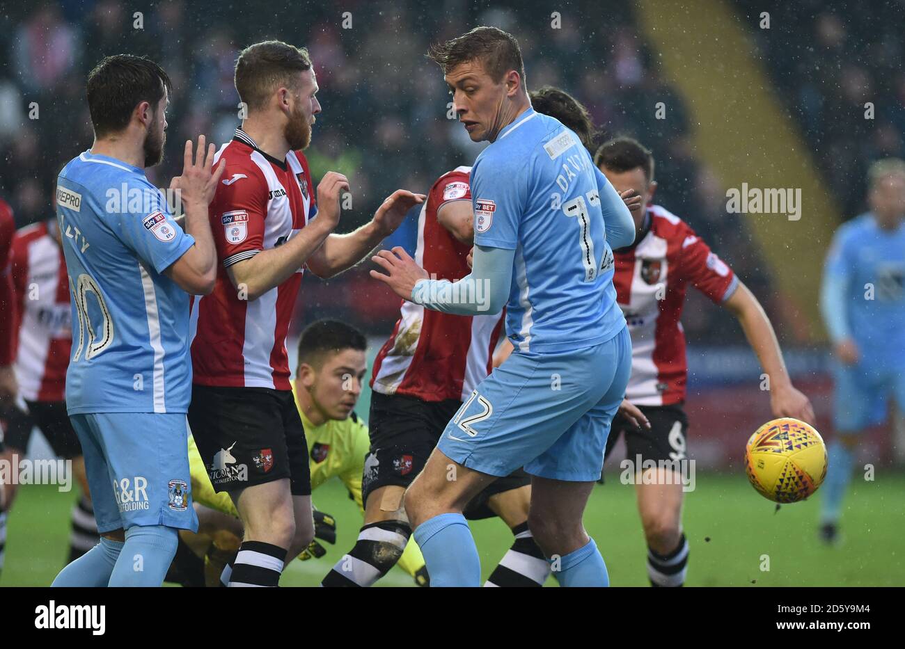 Exeter City's Tom Davies battling for the ball Stock Photo - Alamy