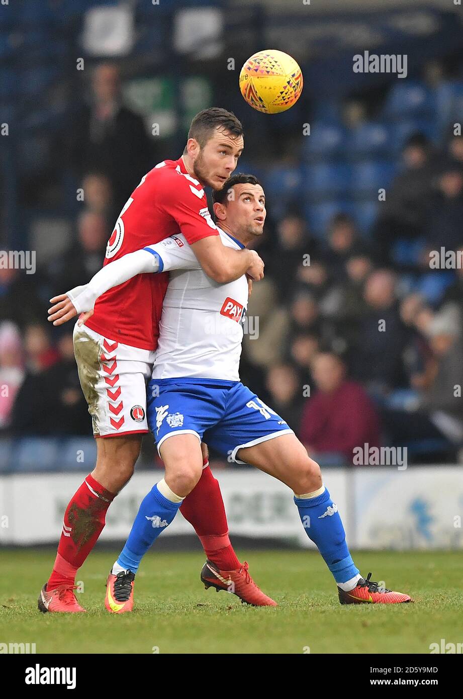 Charlton Athletic's Harry Lennon (left) battles with Bury's Zeli Ismail ...