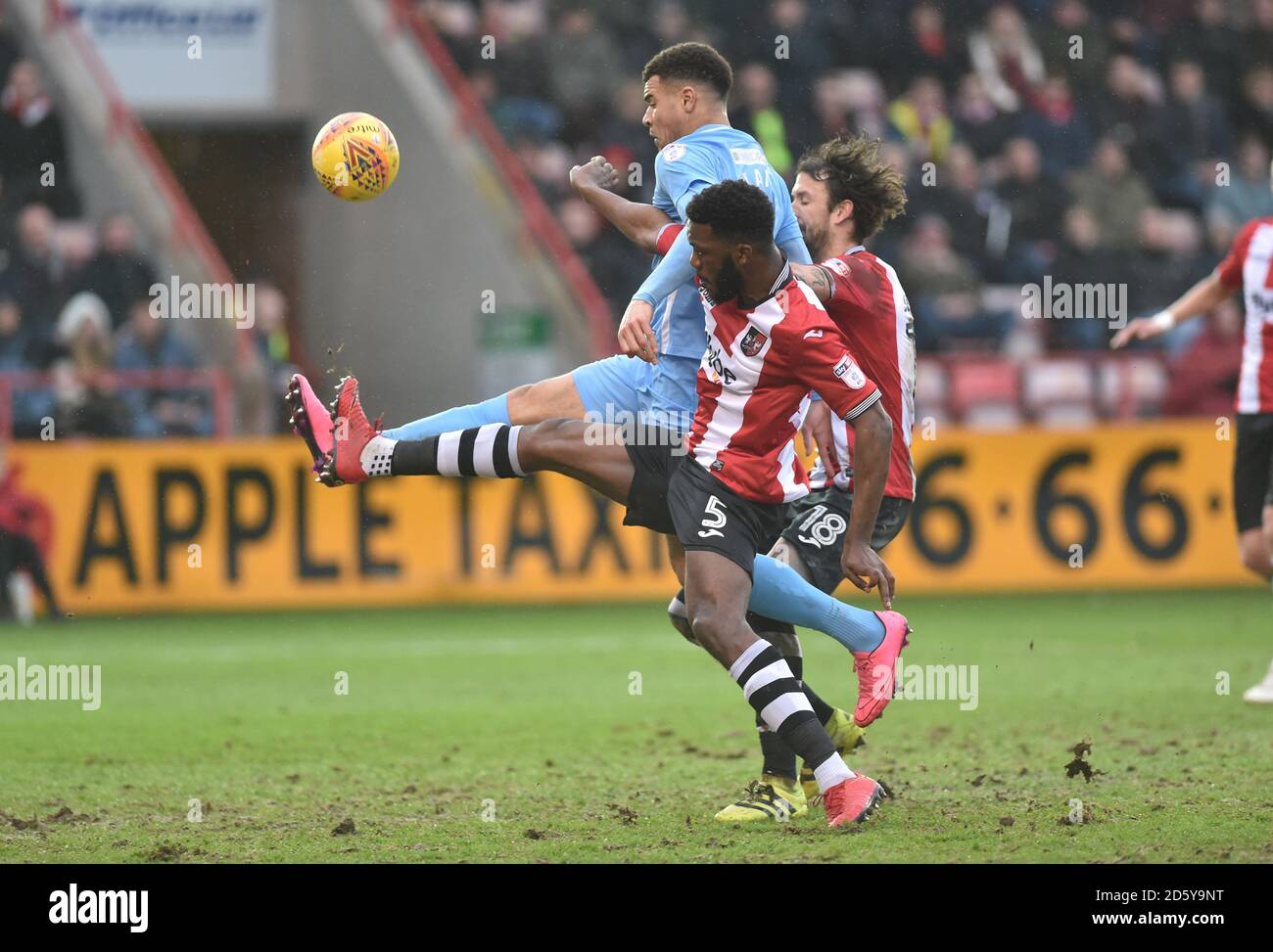 Exeter City's Troy Archibald-Henville (front) and Coventry City's Max ...